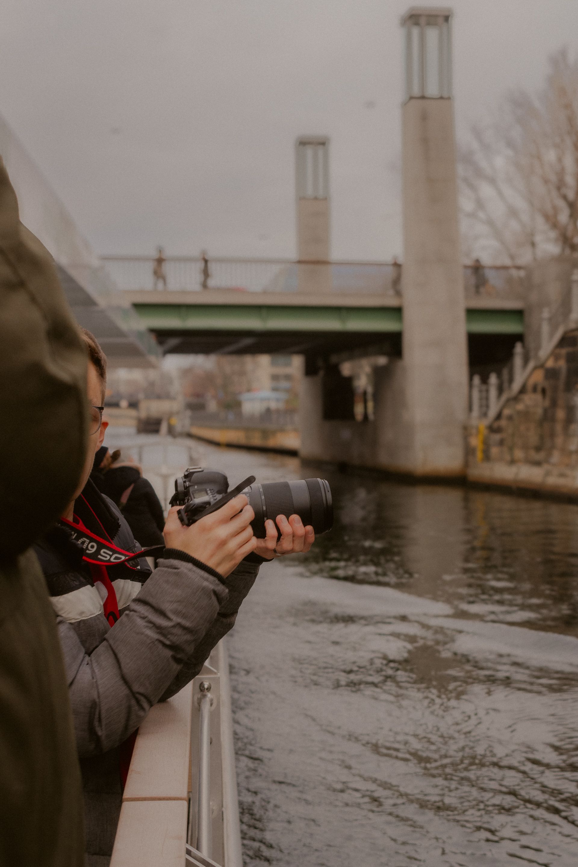 Person with Camera Taking Pictures over River · Free Stock Photo
