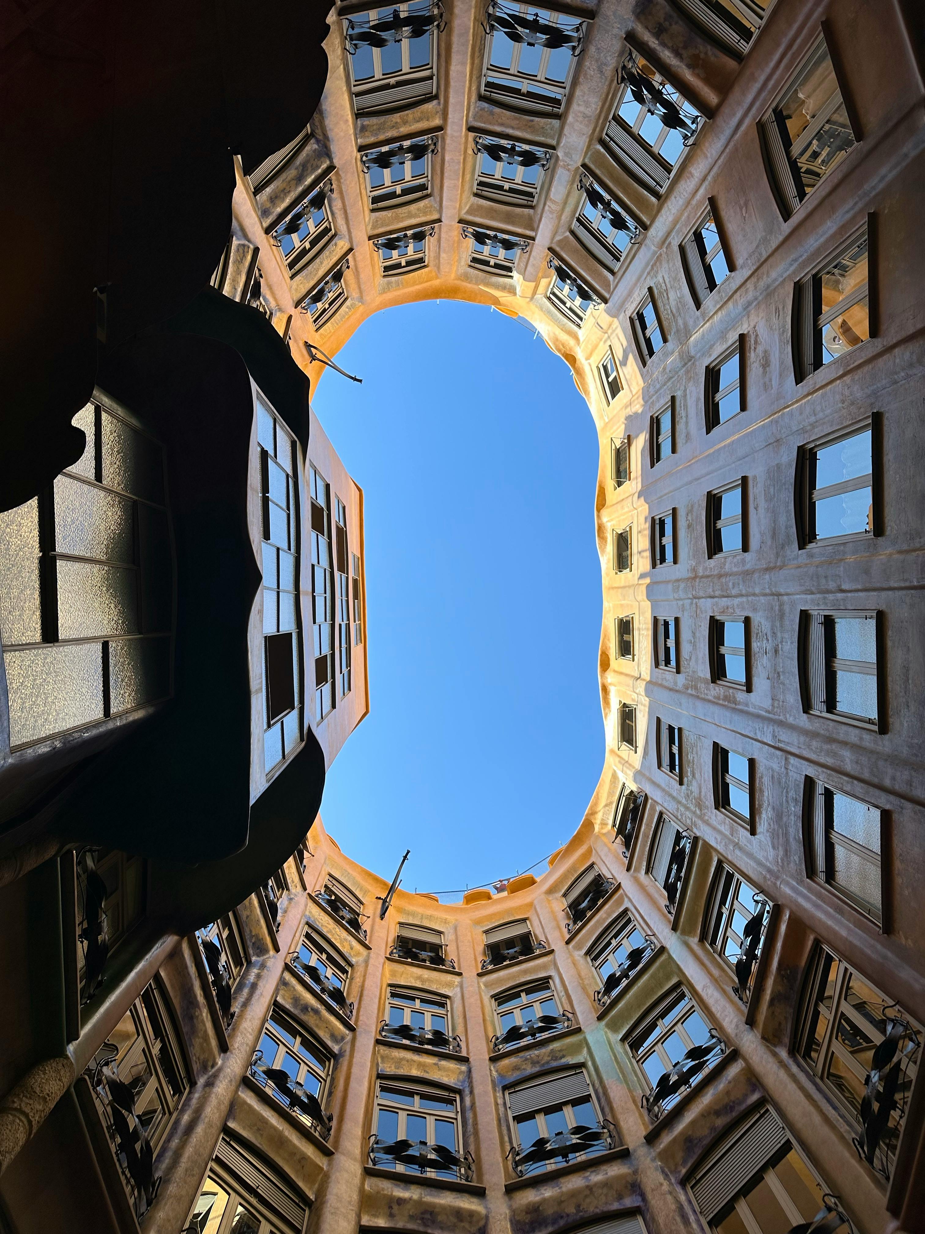 Low Angle Photography of Round Building · Free Stock Photo