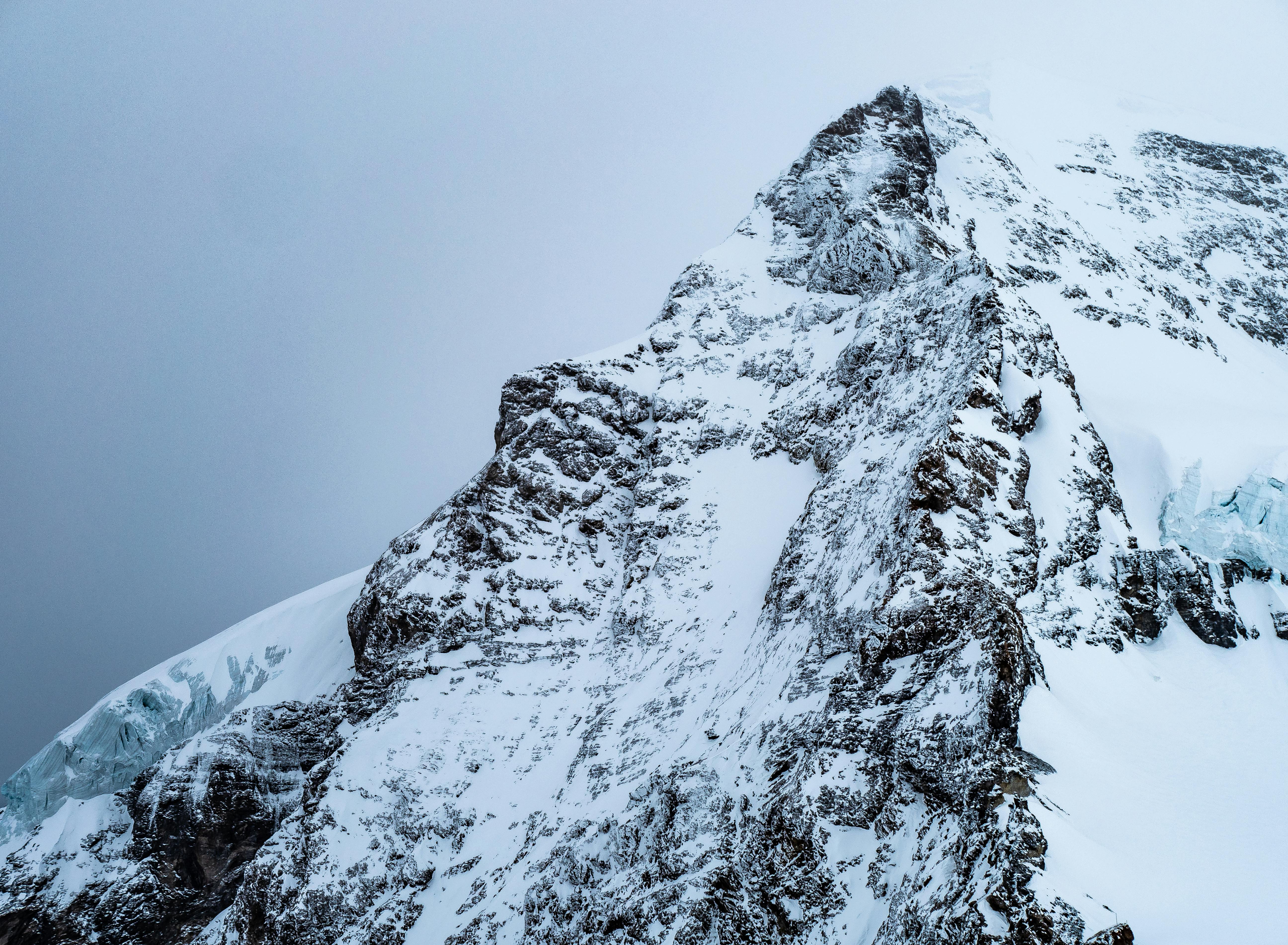 Snow on Rocks on Mountain · Free Stock Photo