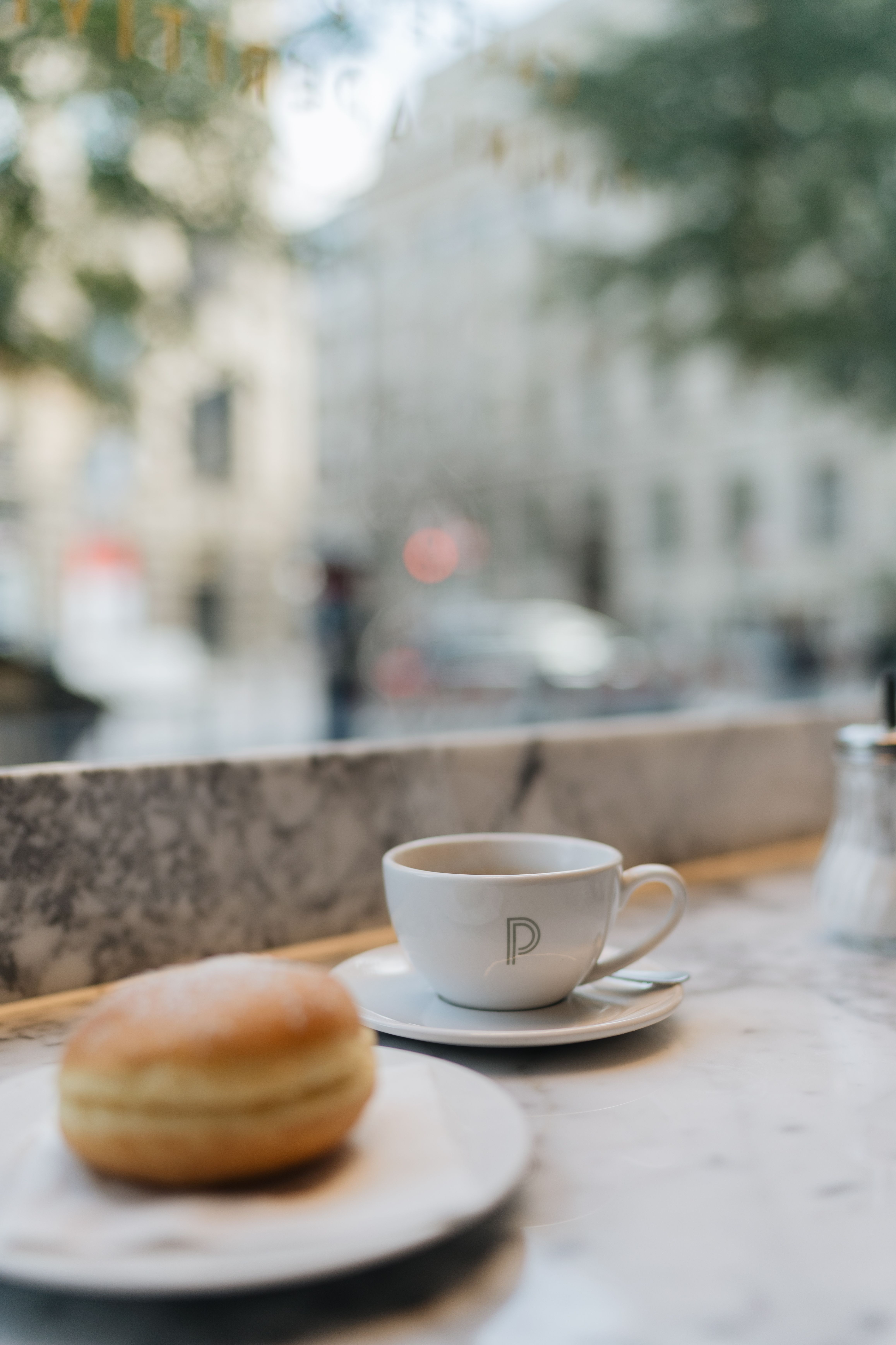 Coffee and Macaroon Served in a Restaurant · Free Stock Photo