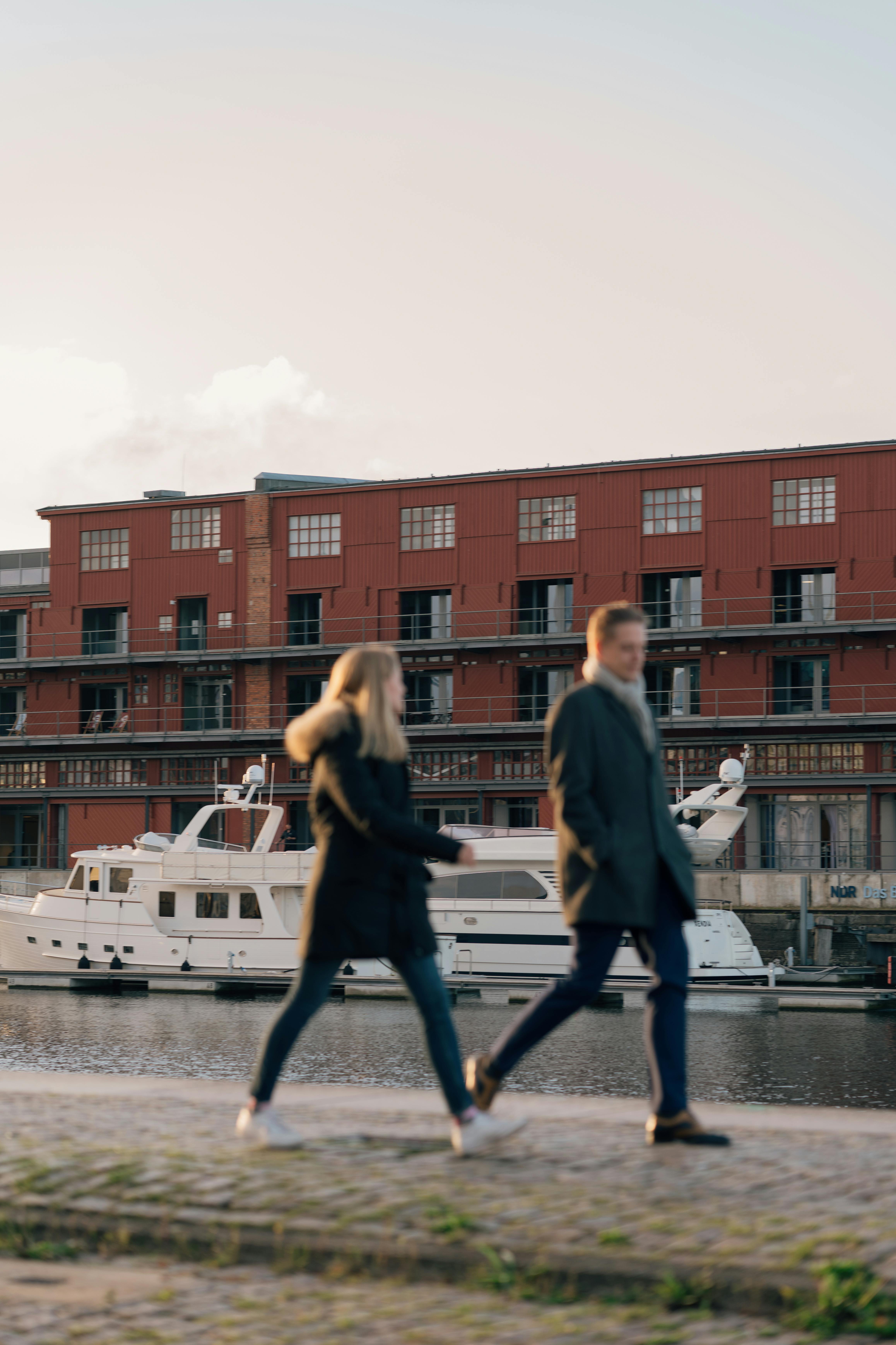 People Walking Near River in City · Free Stock Photo
