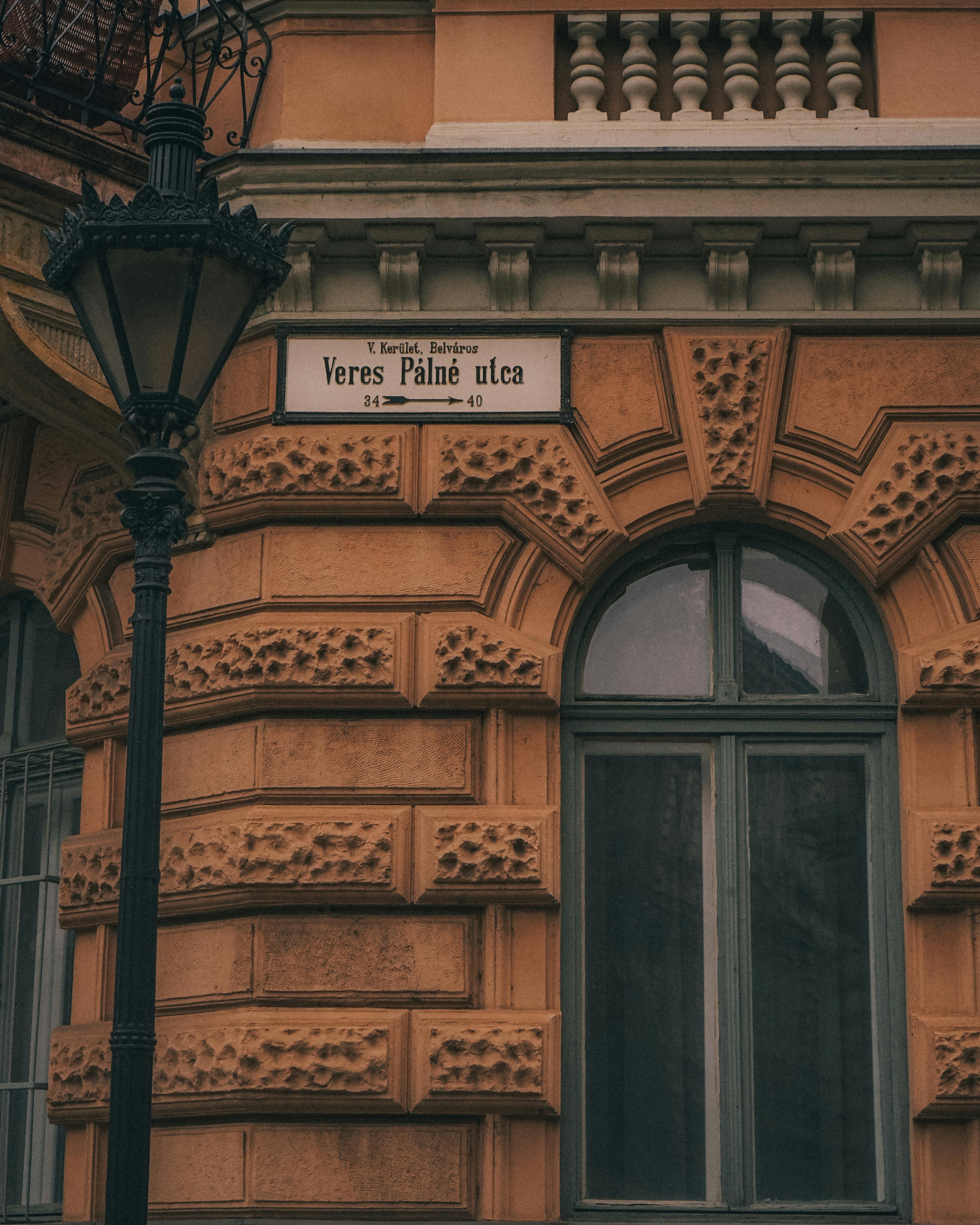 Street Name on Building Wall in Budapest · Free Stock Photo