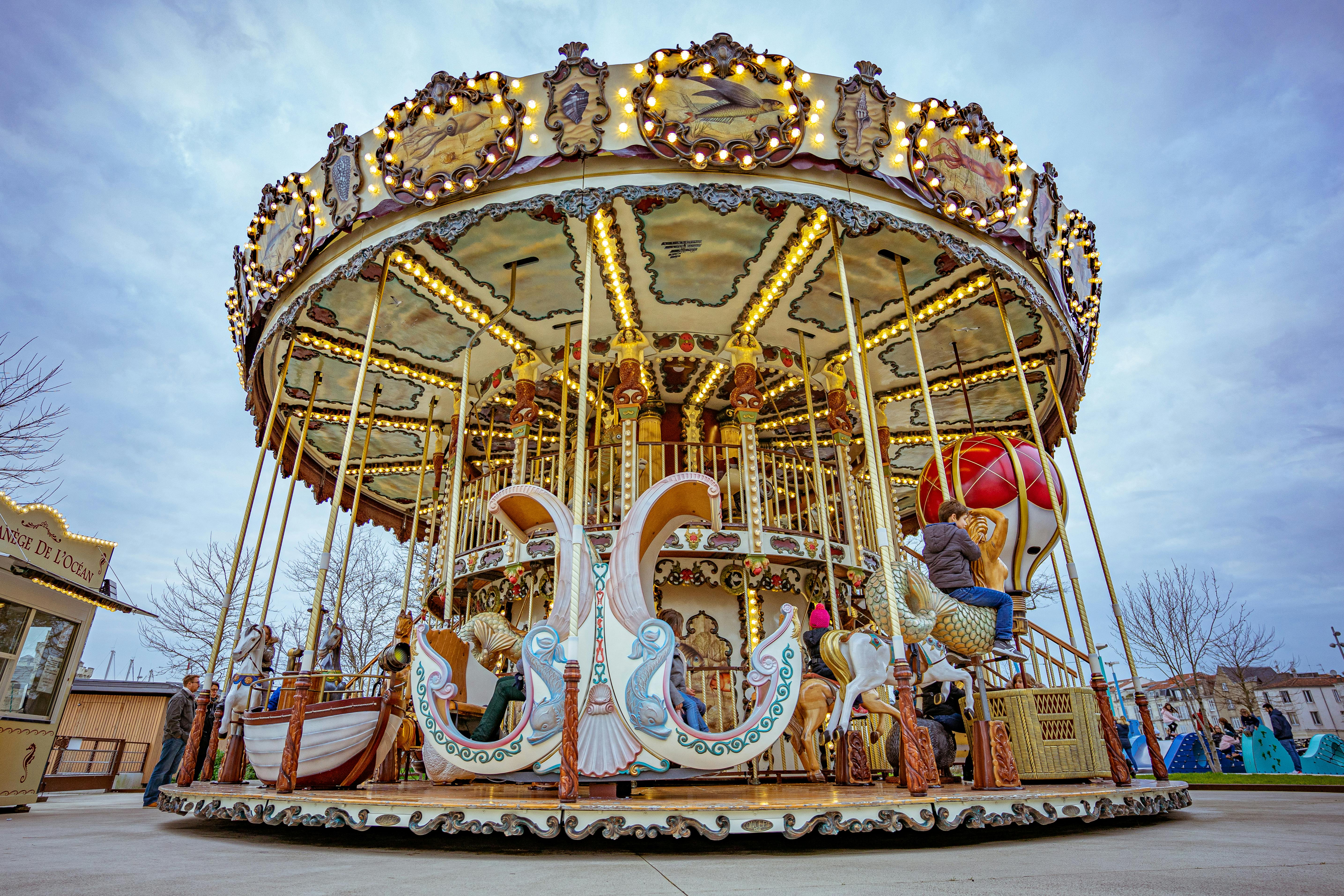 White and Blue Horse Carousel · Free Stock Photo