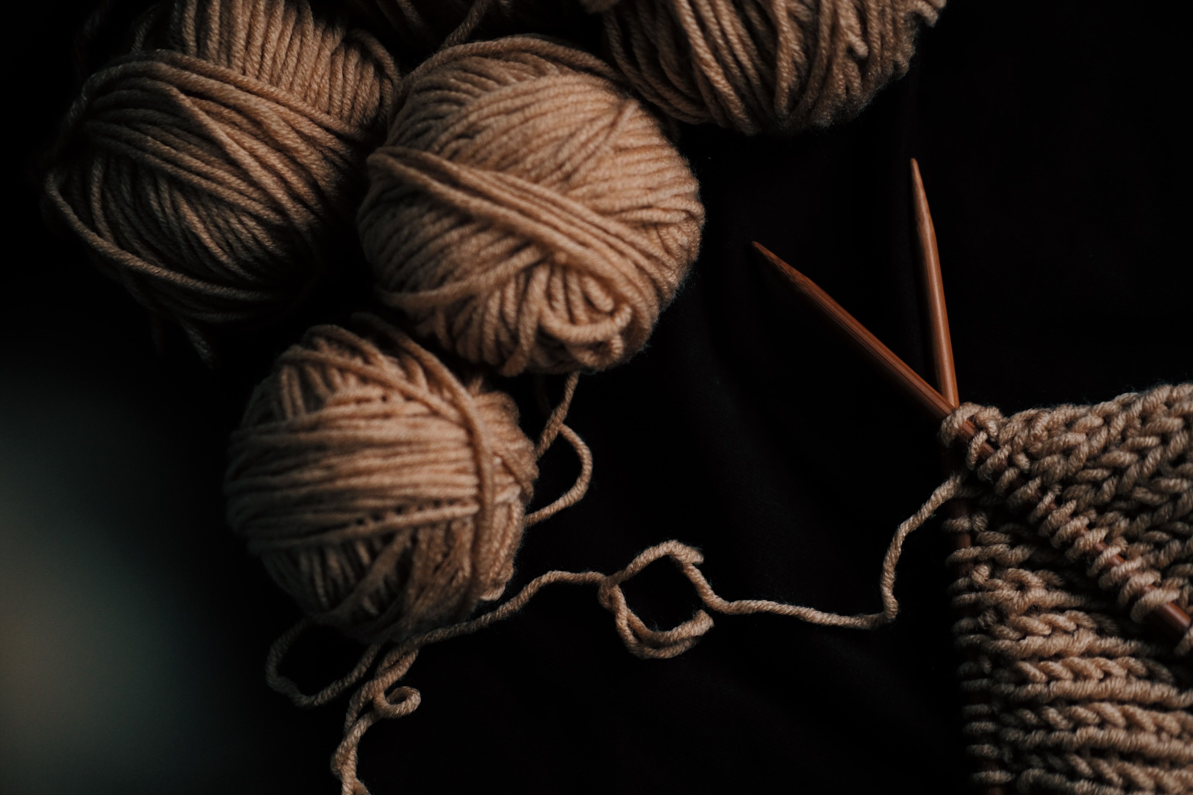 Close Up Photo of Yarn Rolls with Assorted Colors · Free Stock Photo