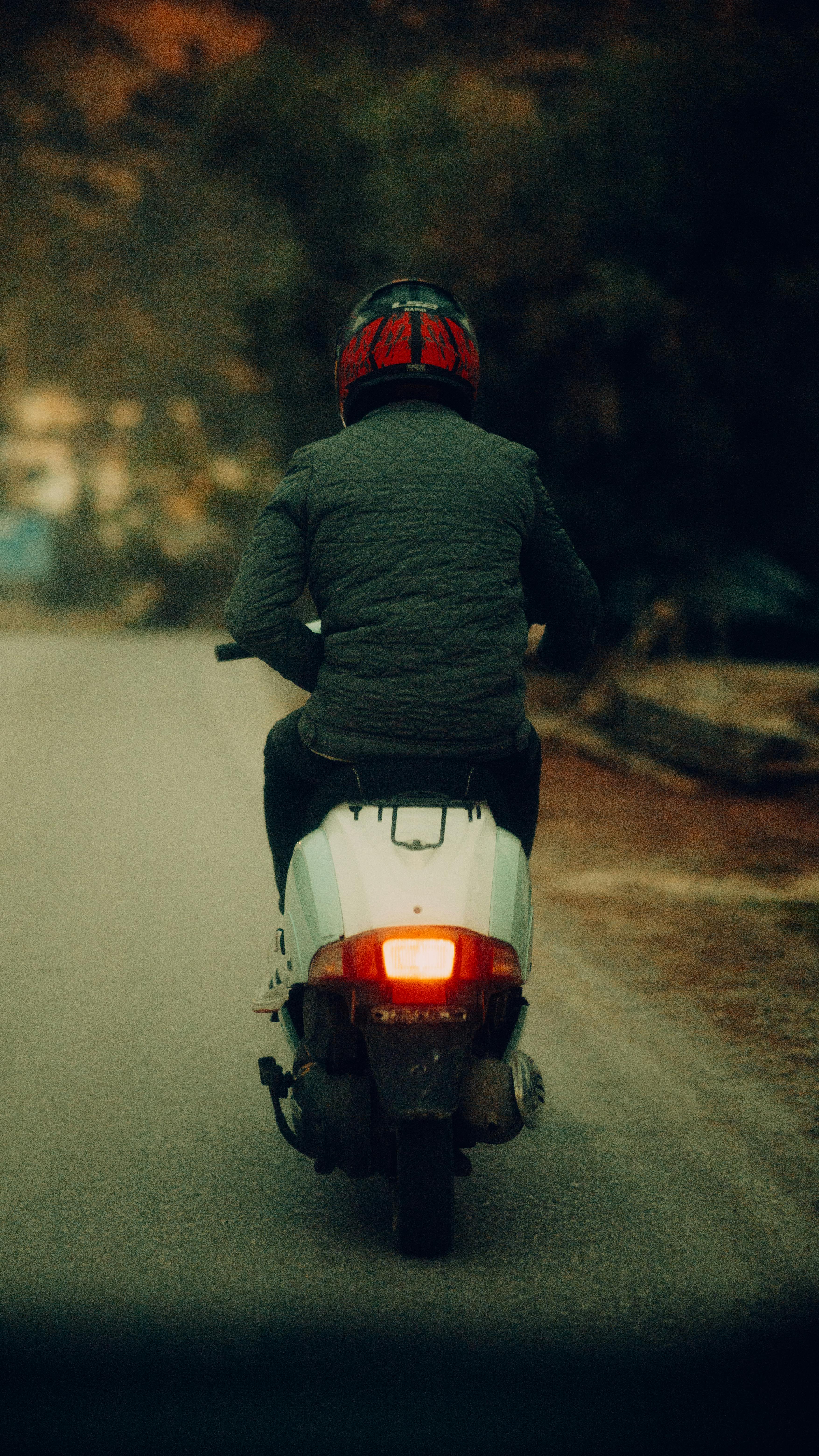 Person with Helmet Riding on Motorbike · Free Stock Photo