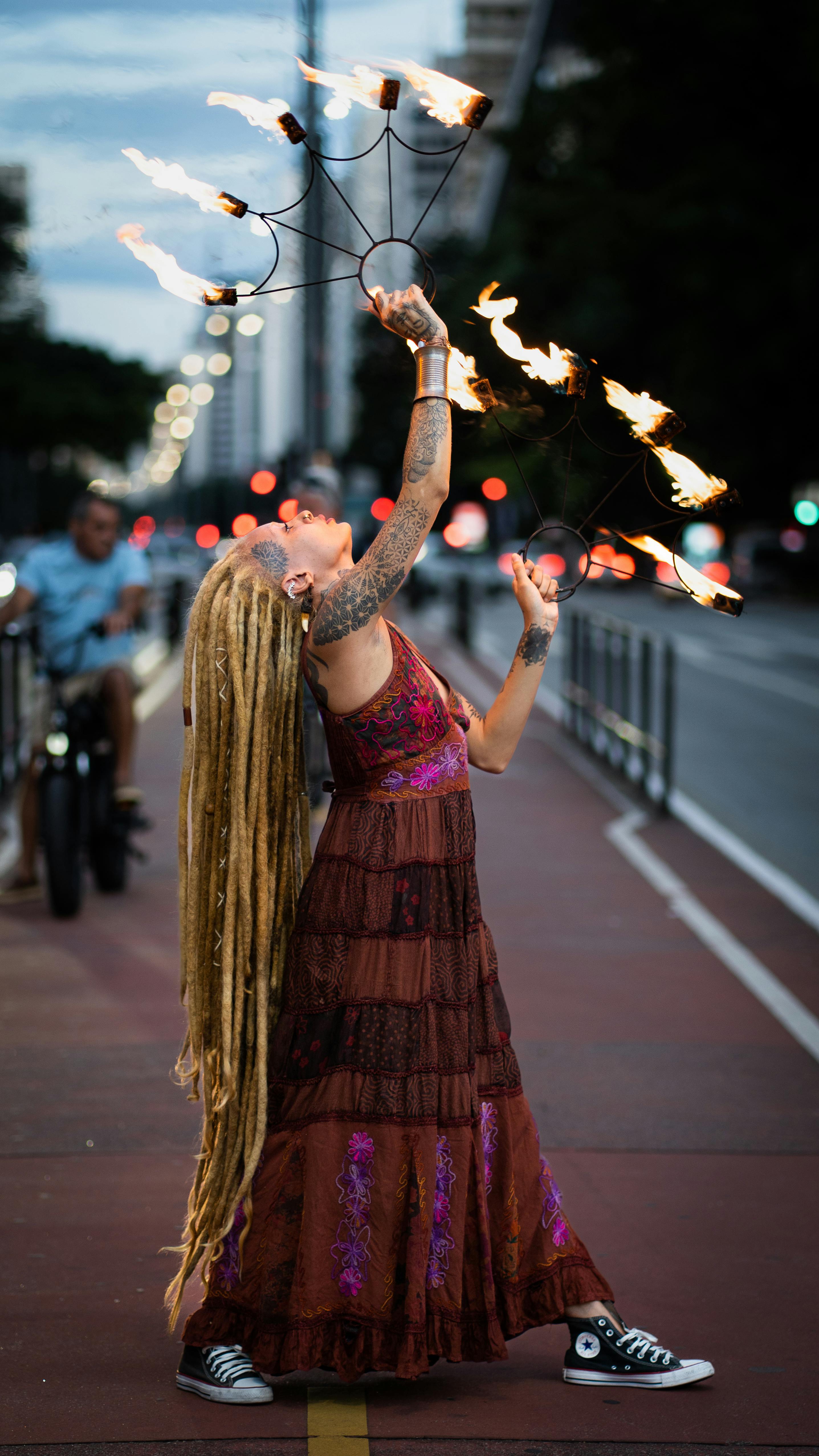 Fire Performance by Woman with Dreadlocks · Free Stock Photo
