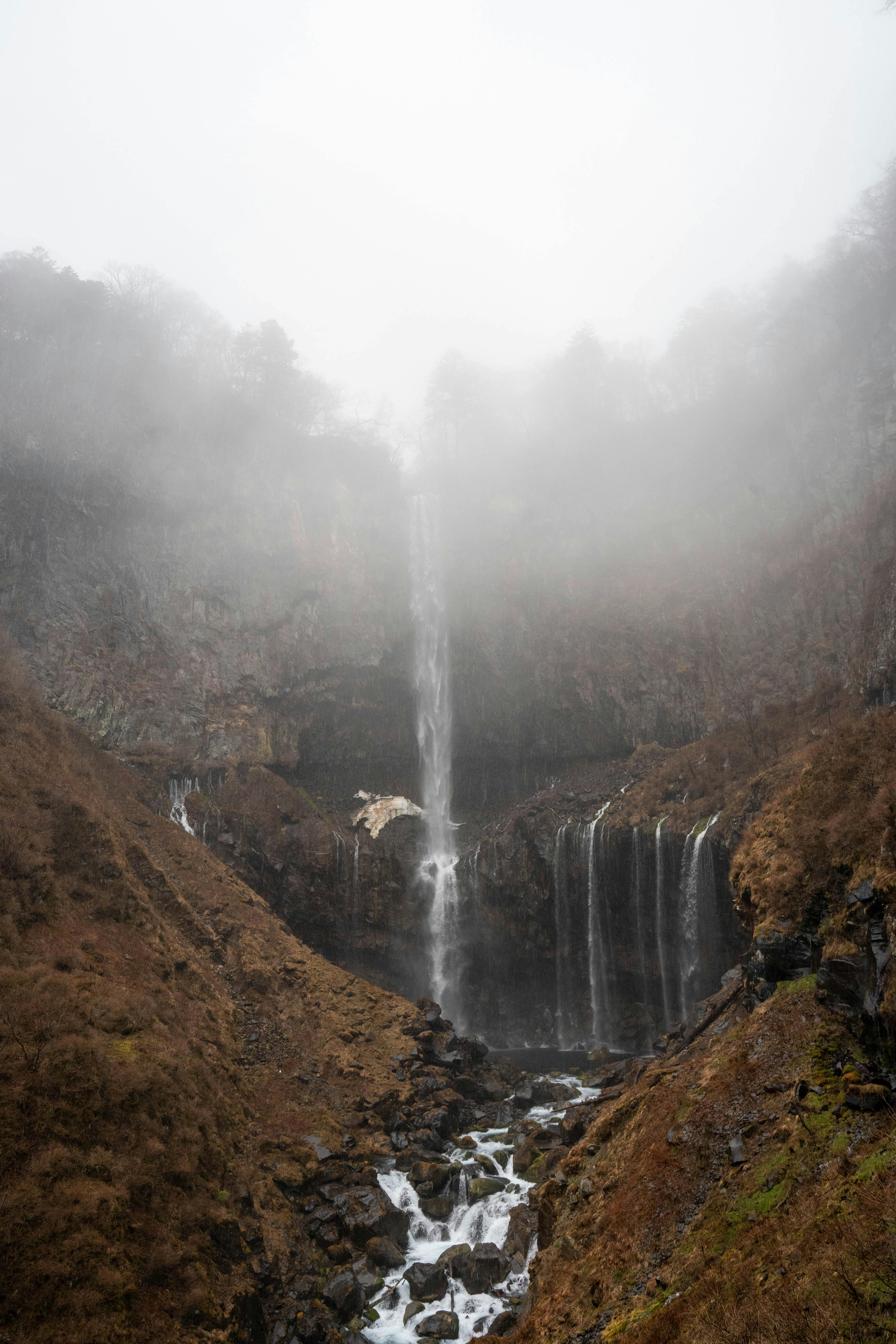 Waterfall in Foggy Autumn Scenery · Free Stock Photo