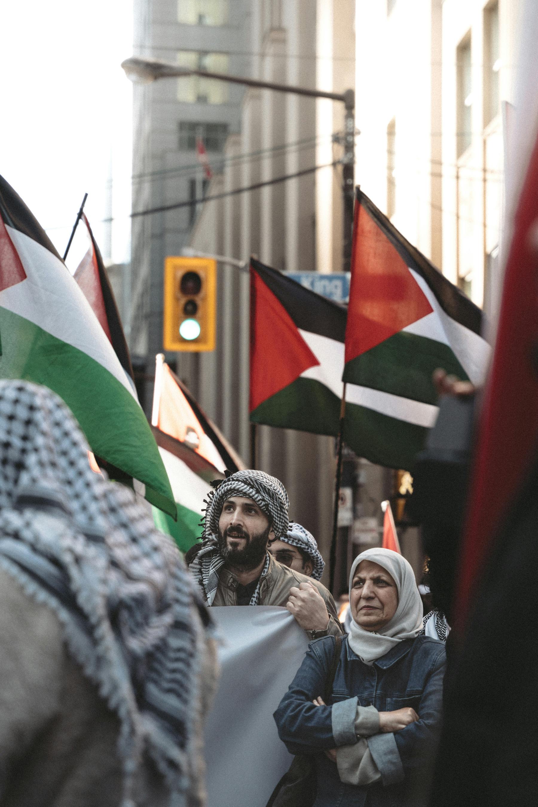 Palestinian Protesters with Flags on the Street · Free Stock Photo