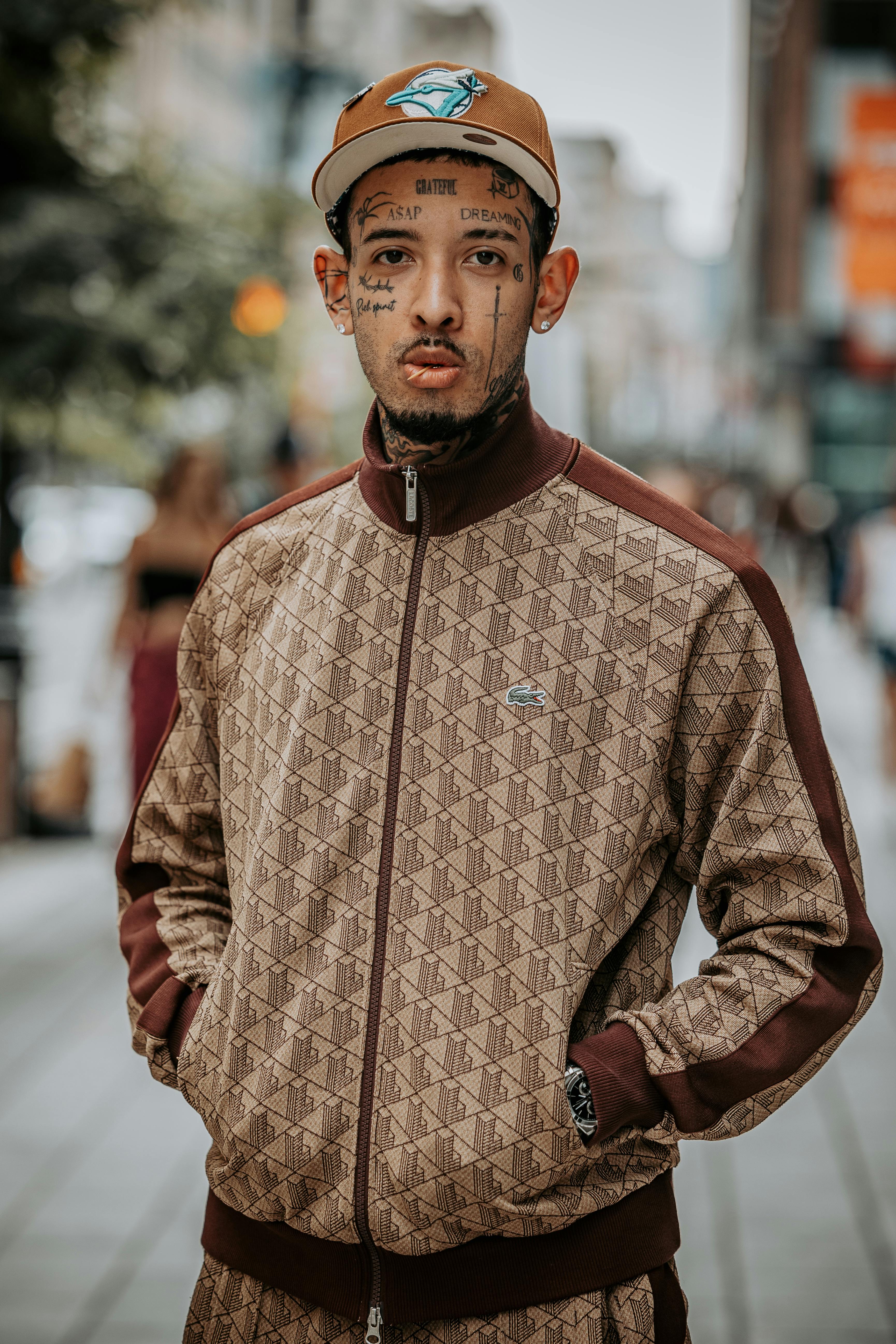 Portrait of Man Wearing Tracksuit on a Street · Free Stock Photo