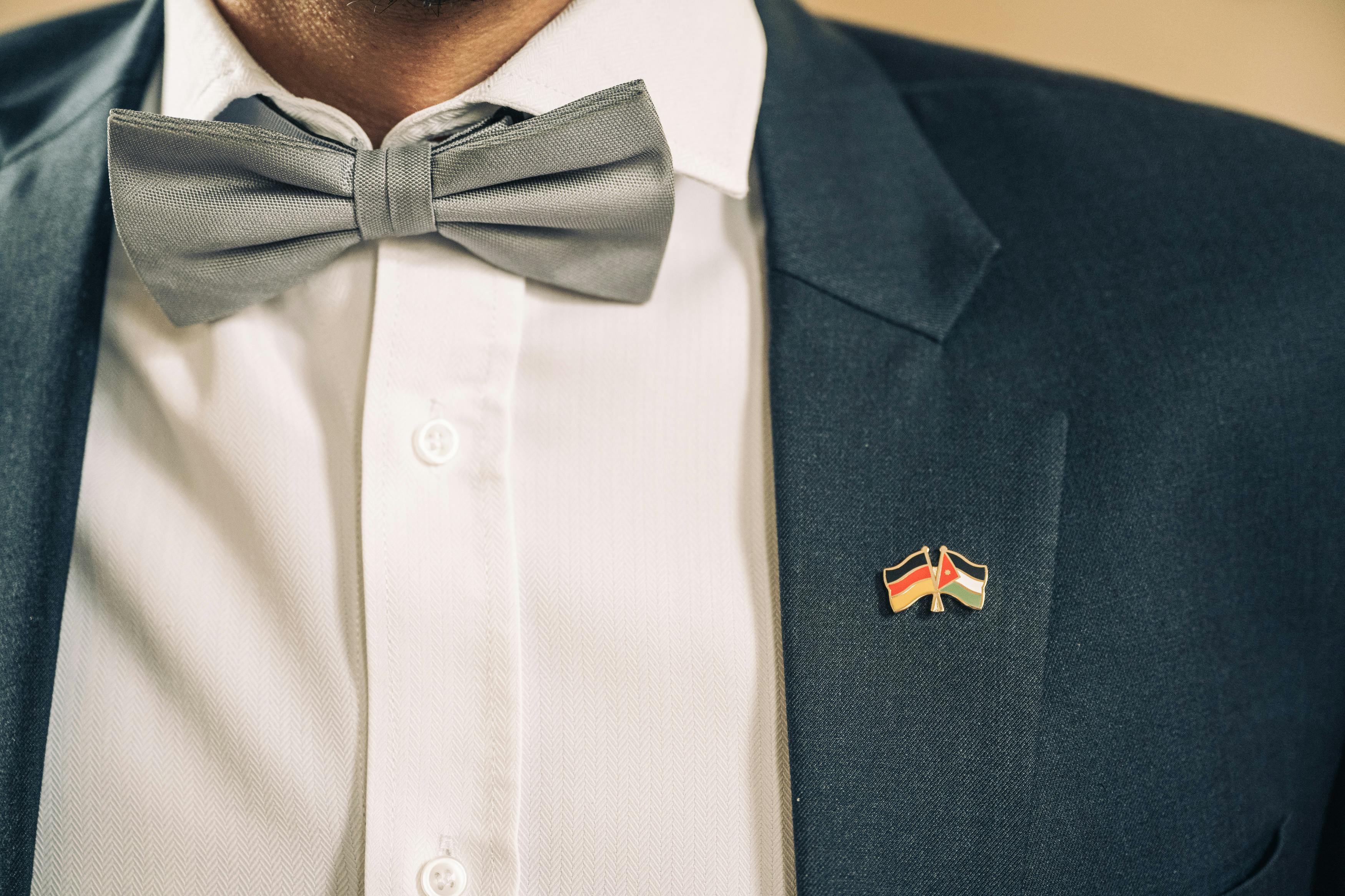 Flags of Germany and Palestine on Suit · Free Stock Photo