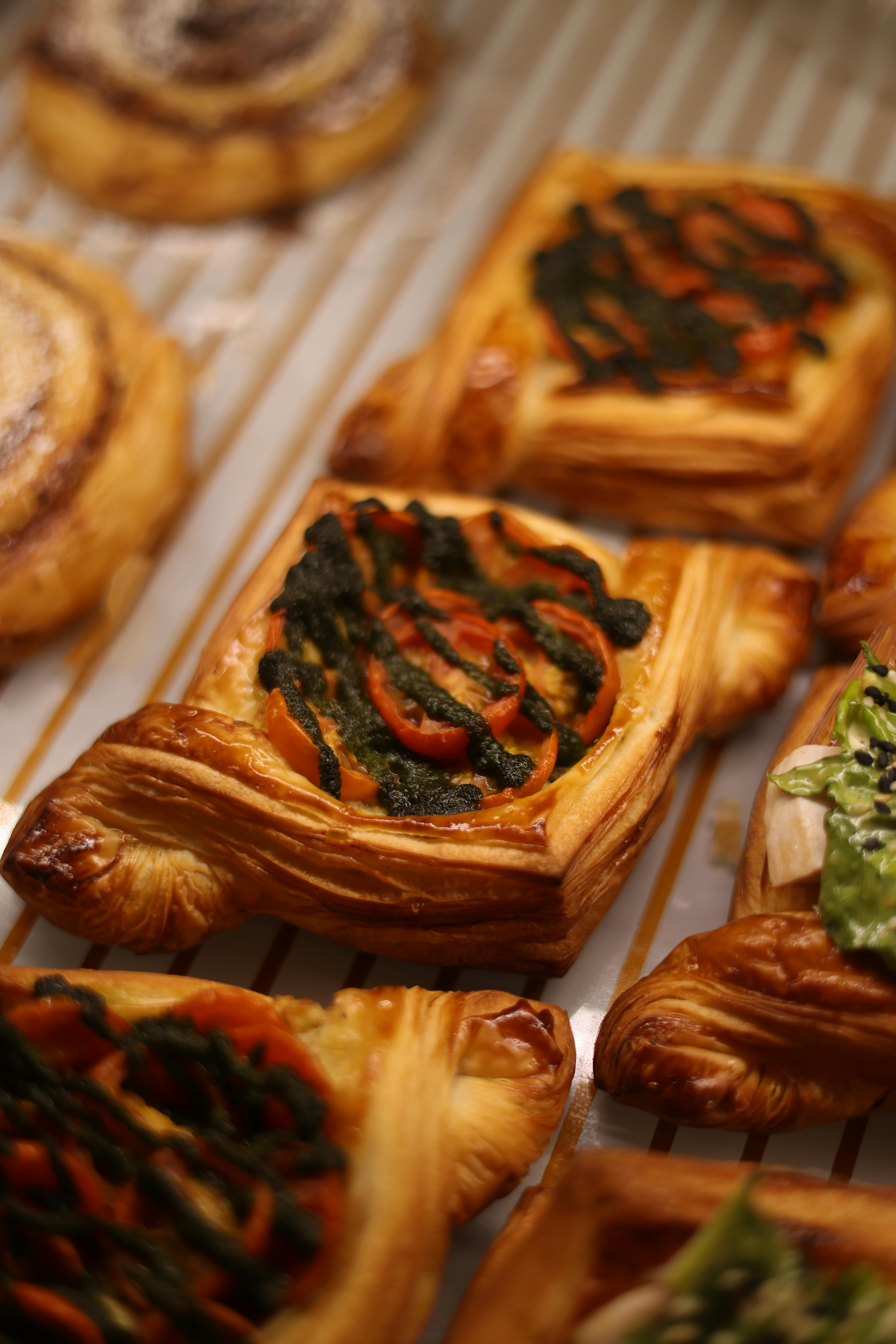 Puff Pastries Served in a Bakery · Free Stock Photo