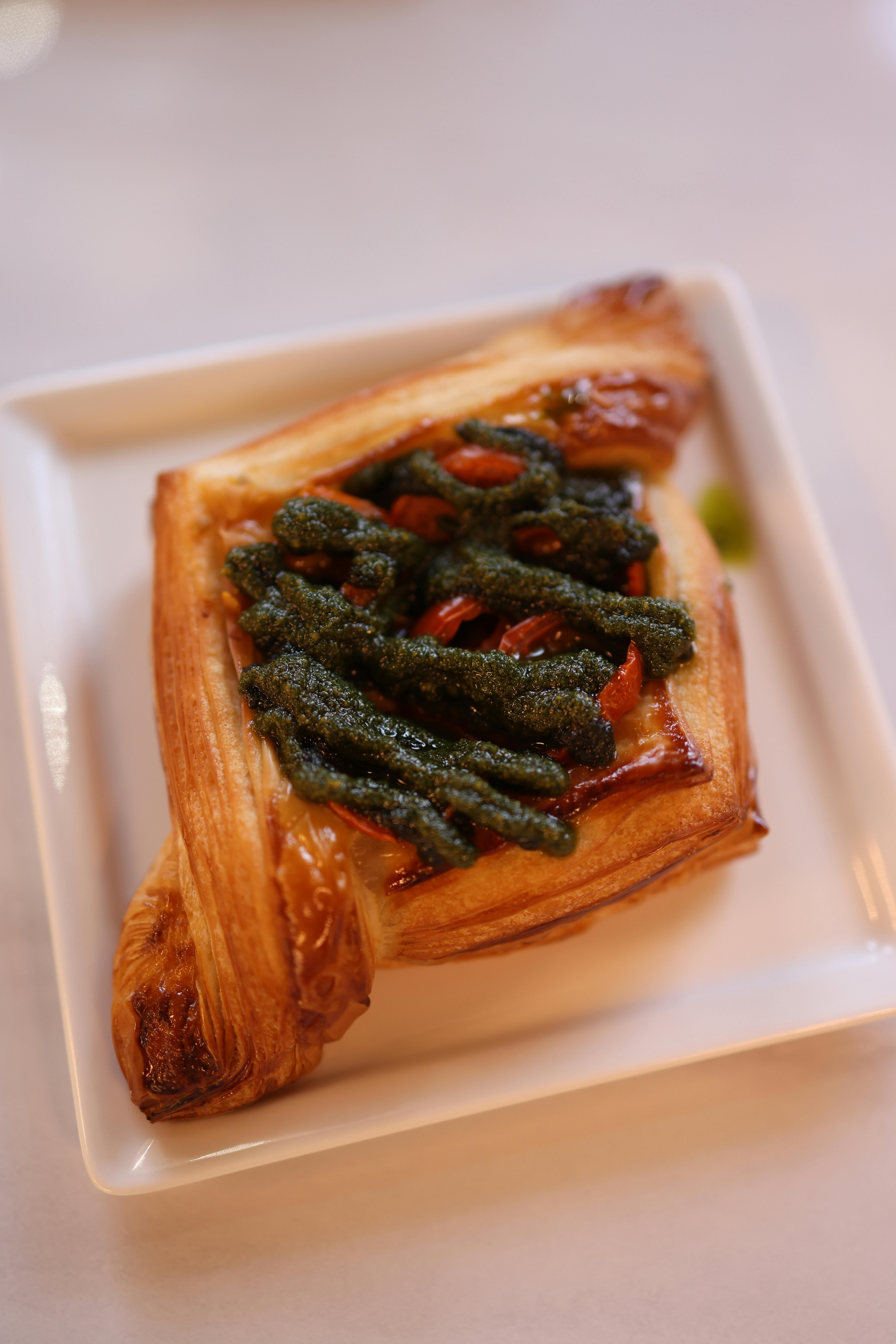 Crispy Croissant with Toppings on a Plate · Free Stock Photo