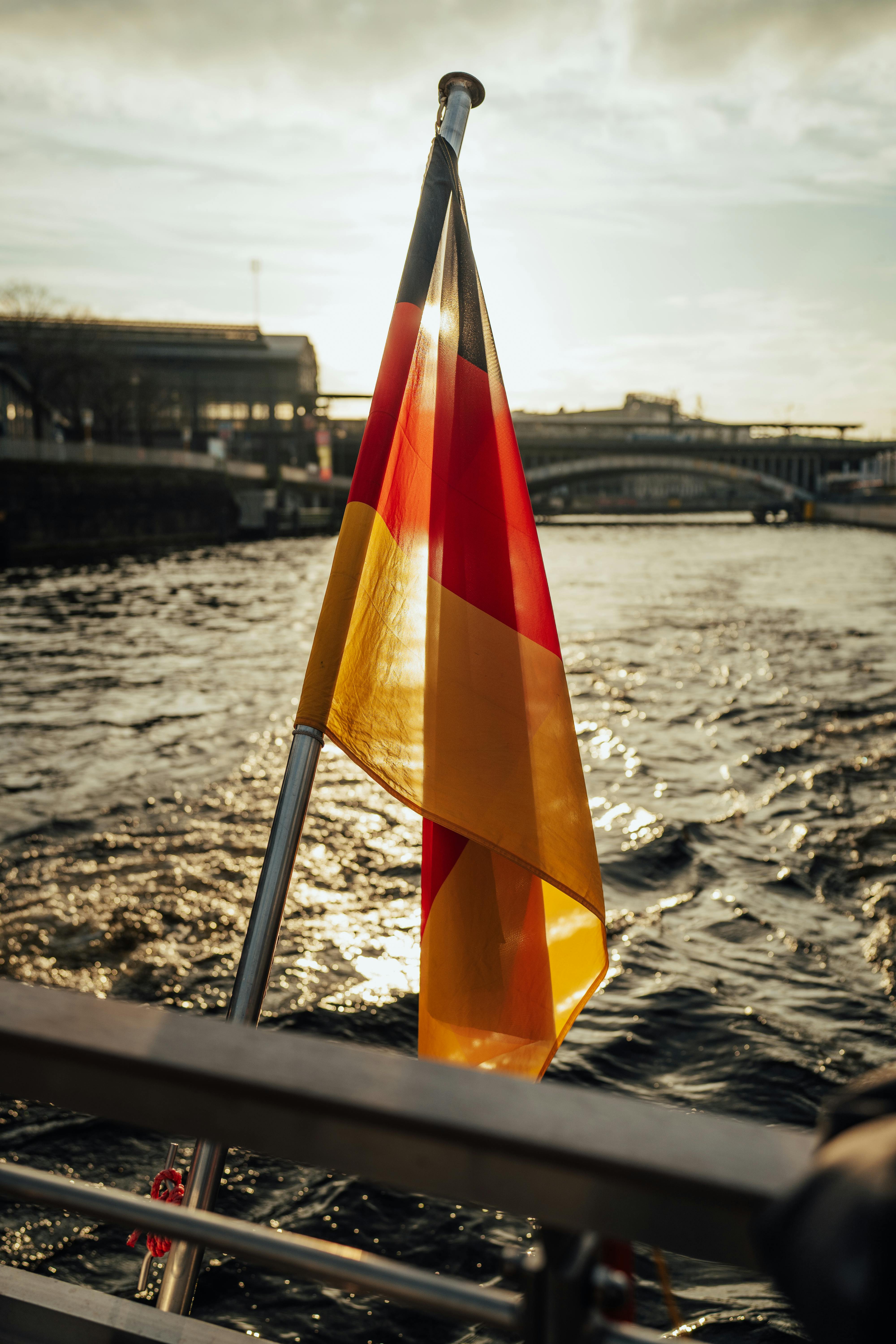Flag of Germany on Railing · Free Stock Photo