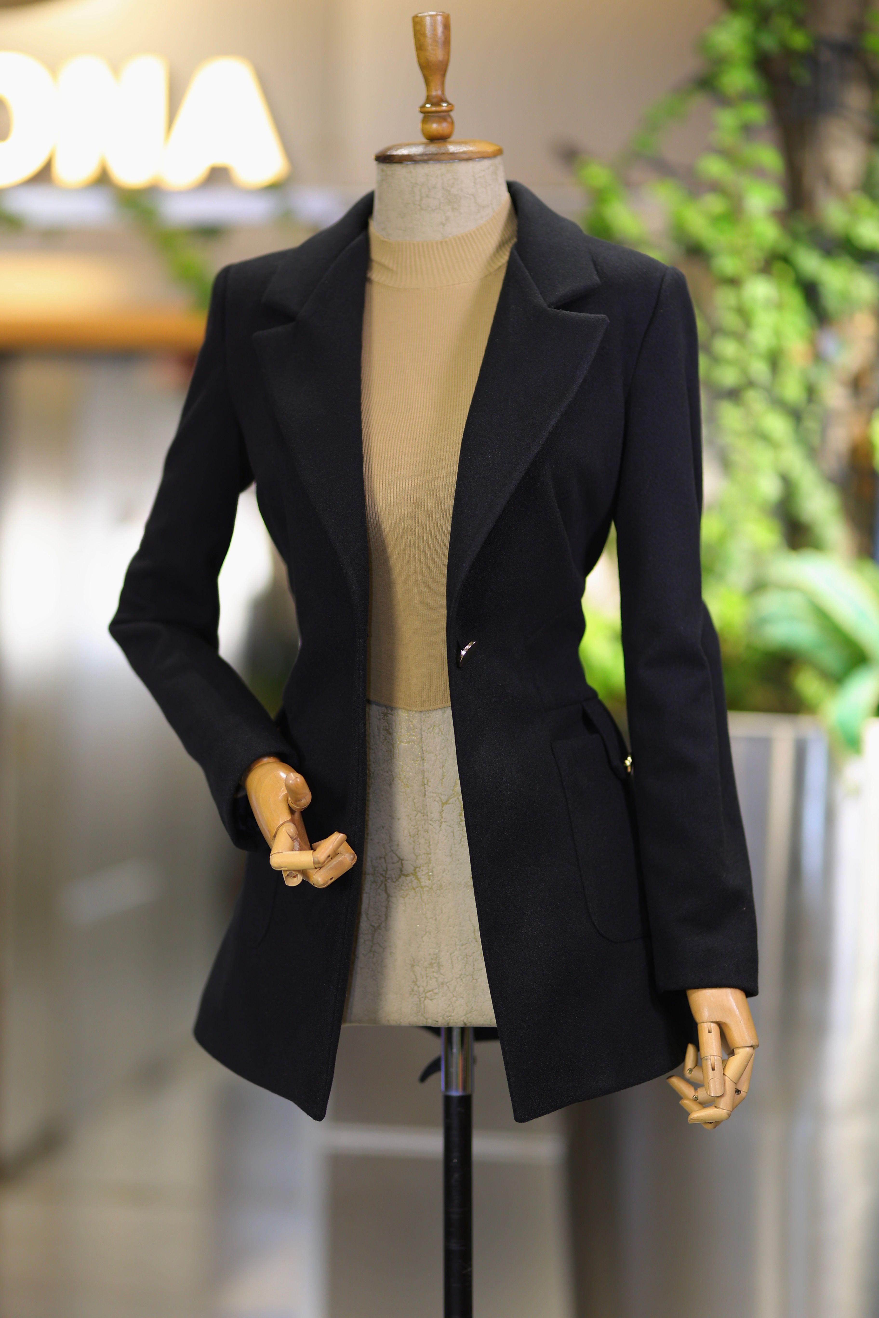Elegant Coat on Store Display · Free Stock Photo