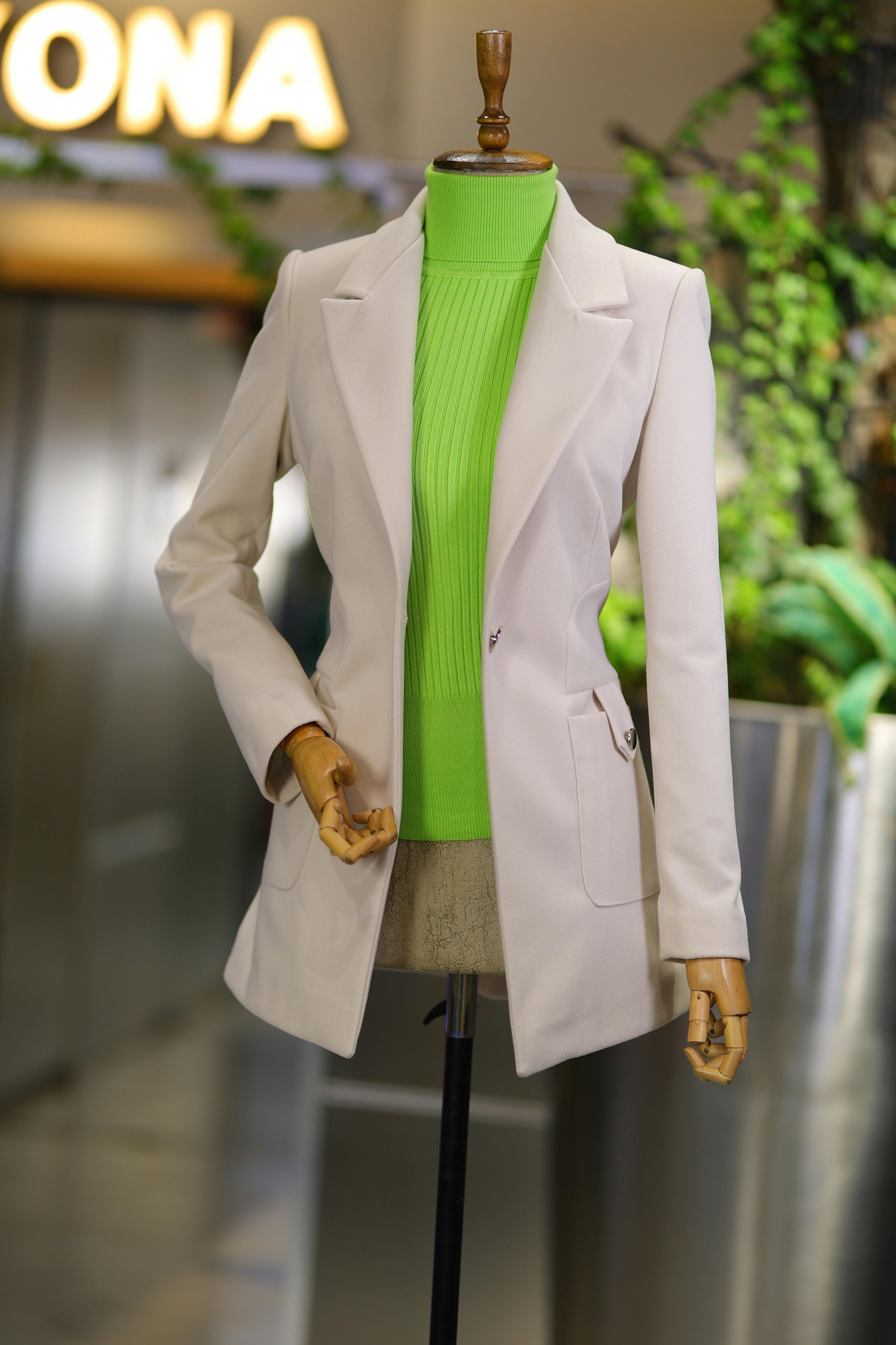 Sweater and Coat on a Mannequin · Free Stock Photo