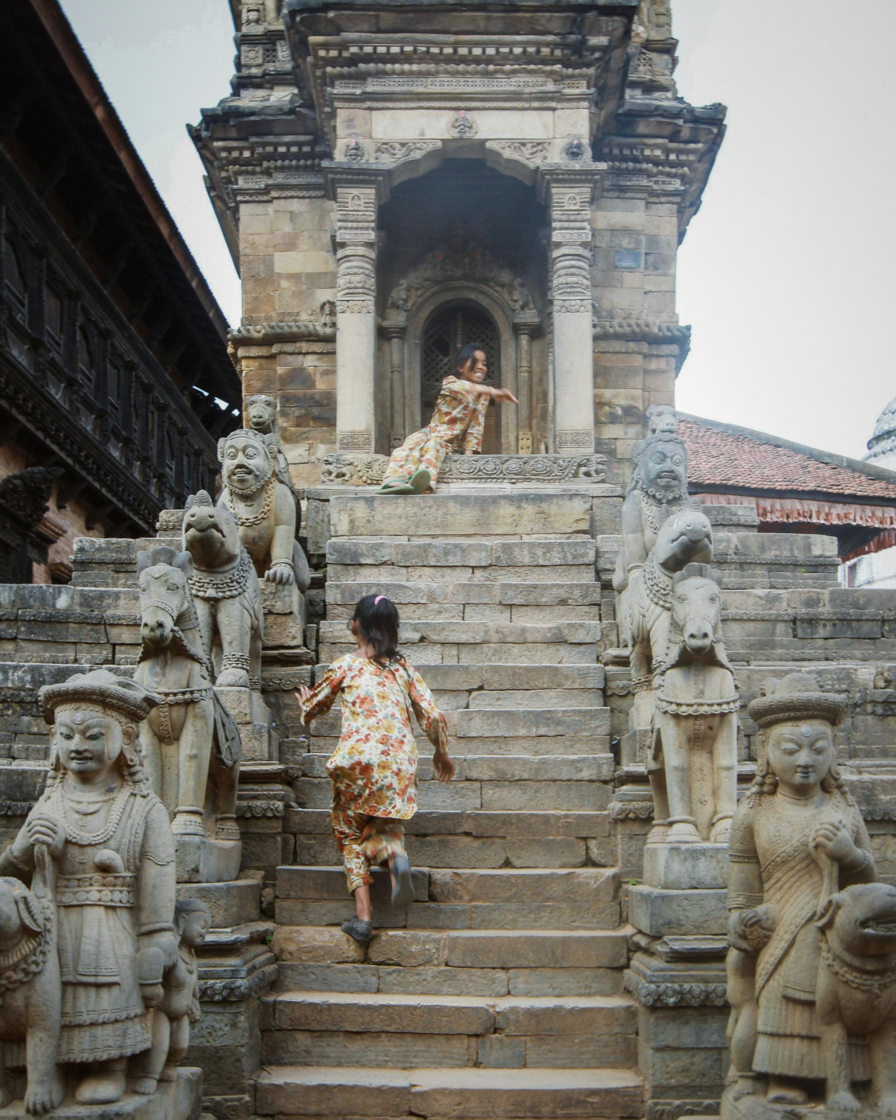 A Girl Walking up the Stairs in Siddhi Lakshmi Shikara Hindu Temple on ...
