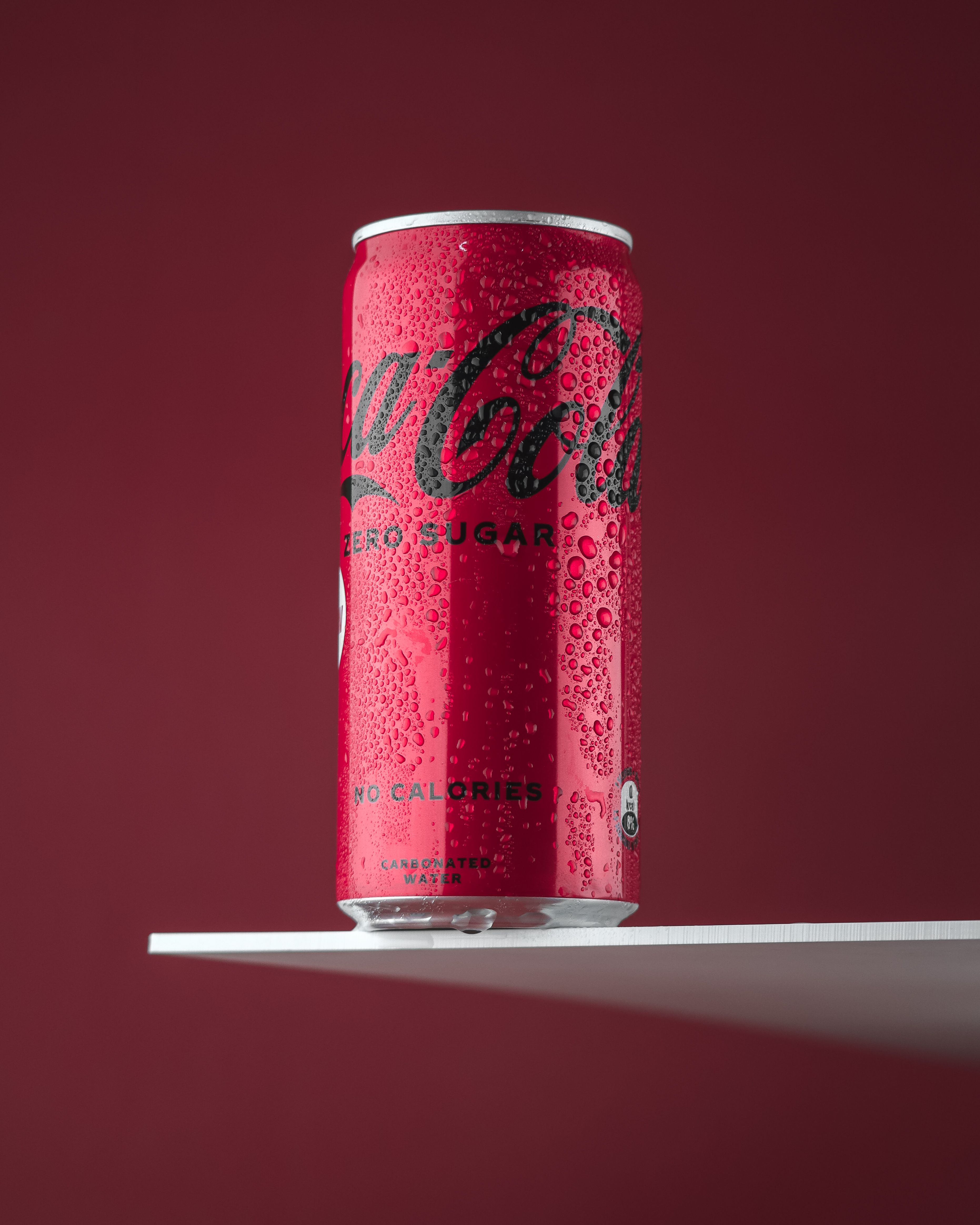Water Dripping from the Table with Red Can of Coca-Cola Zero · Free ...