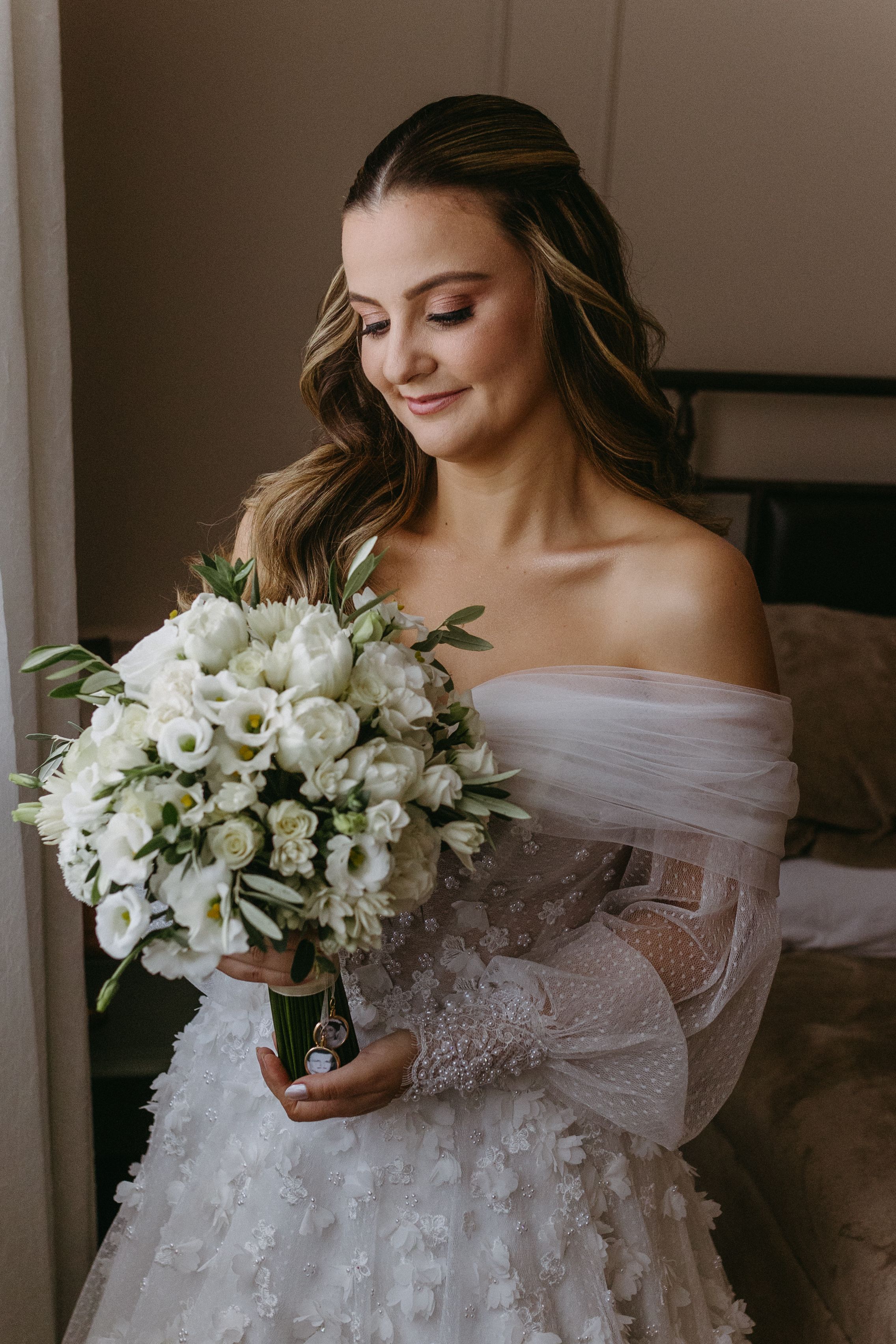 Smiling Bride Holding a Bouquet · Free Stock Photo