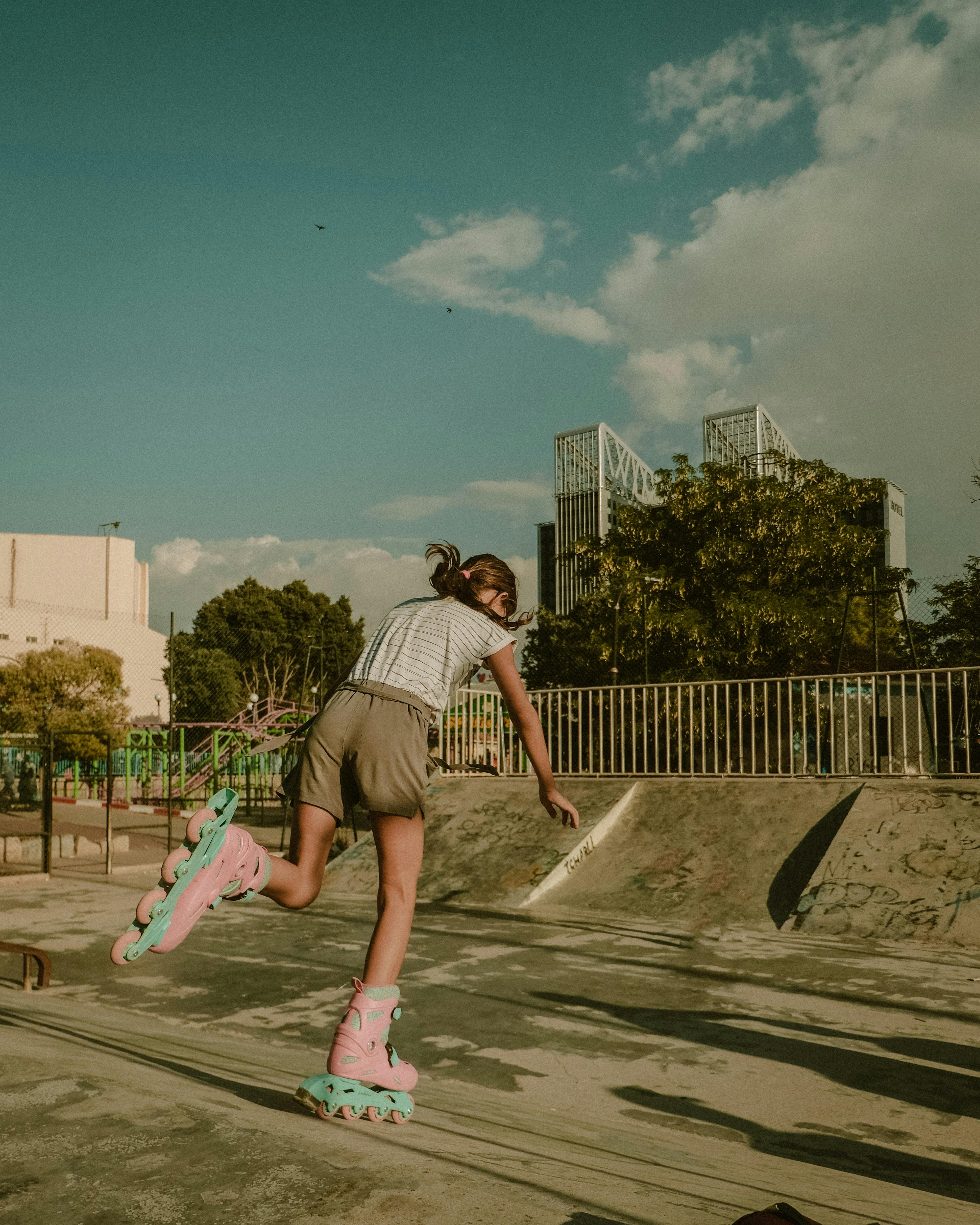 Monochrome Photo of Person Roller Skating · Free Stock Photo