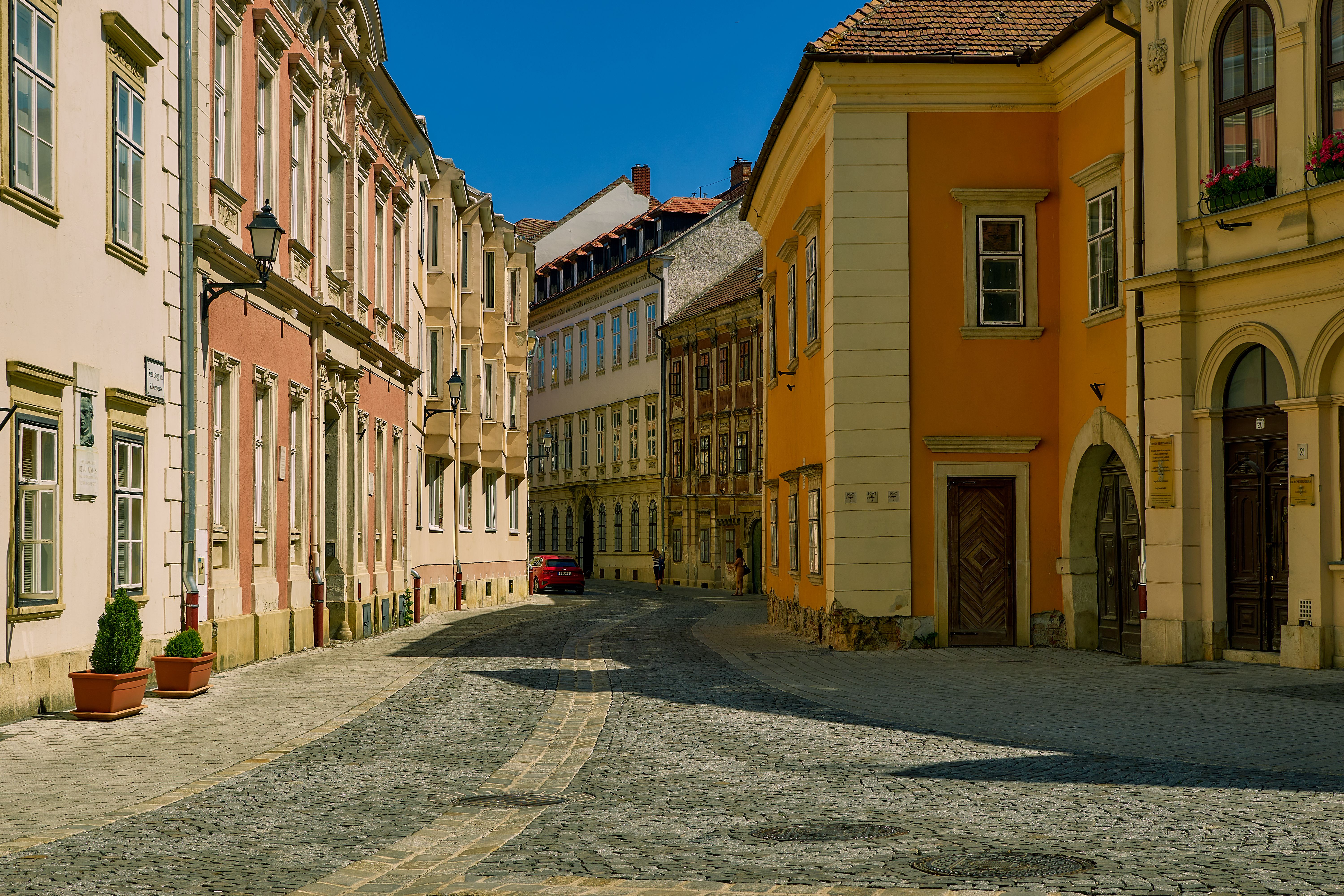 View of an Empty Street between Historic Apartment Buildings · Free ...