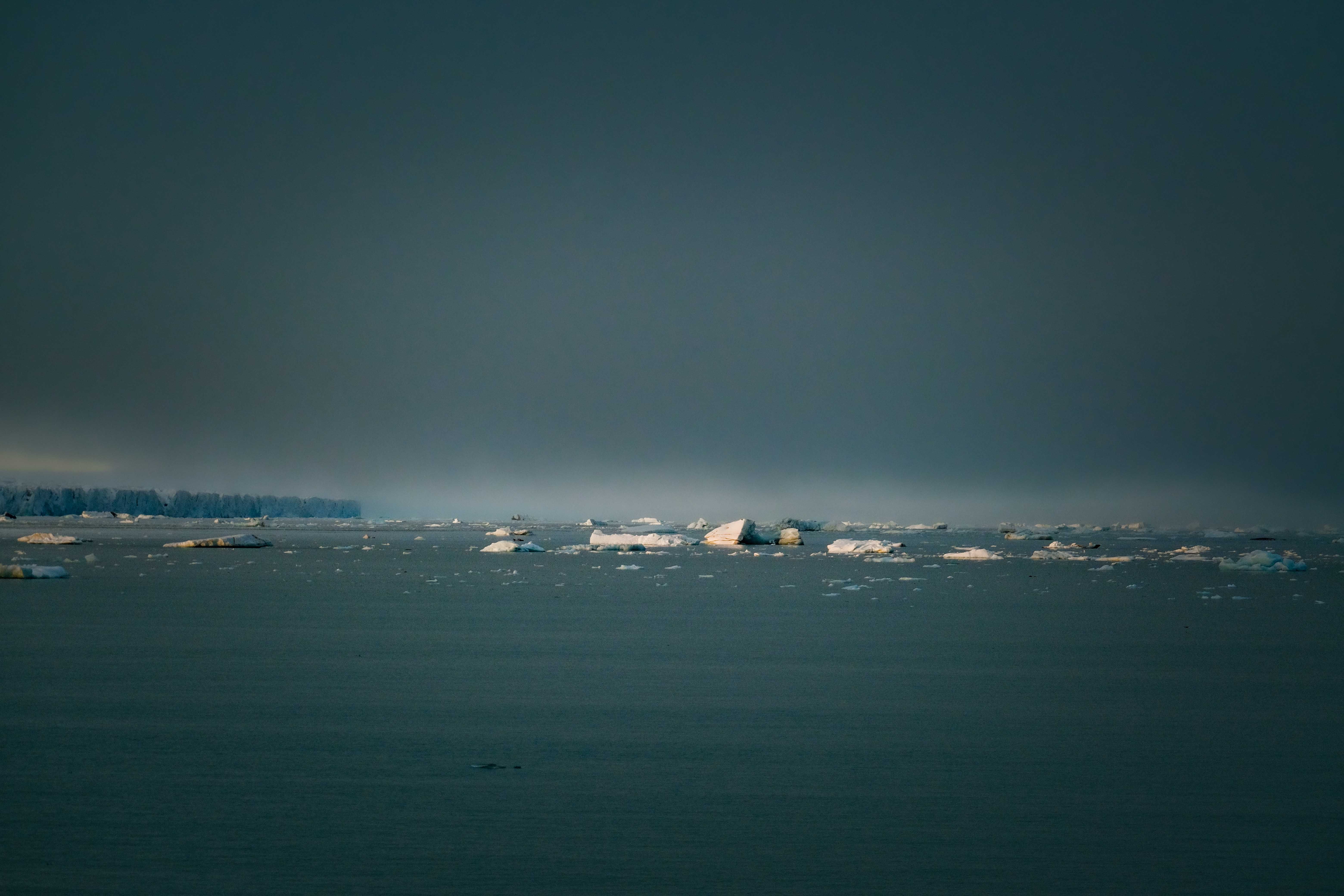 View of a Frozen Surface with Pieces of Ice Scattered Across · Free ...