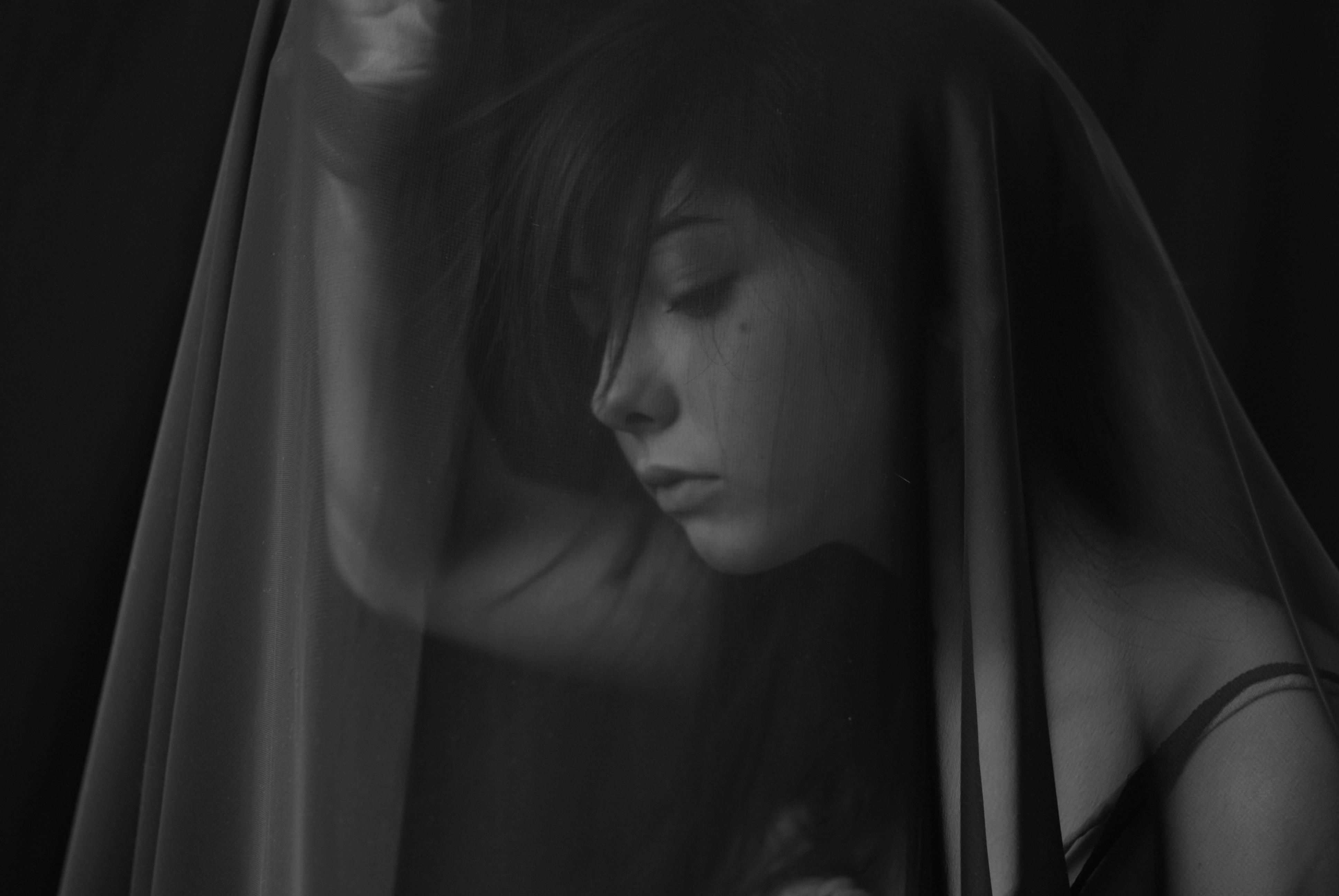 A woman with her veil covering her face · Free Stock Photo