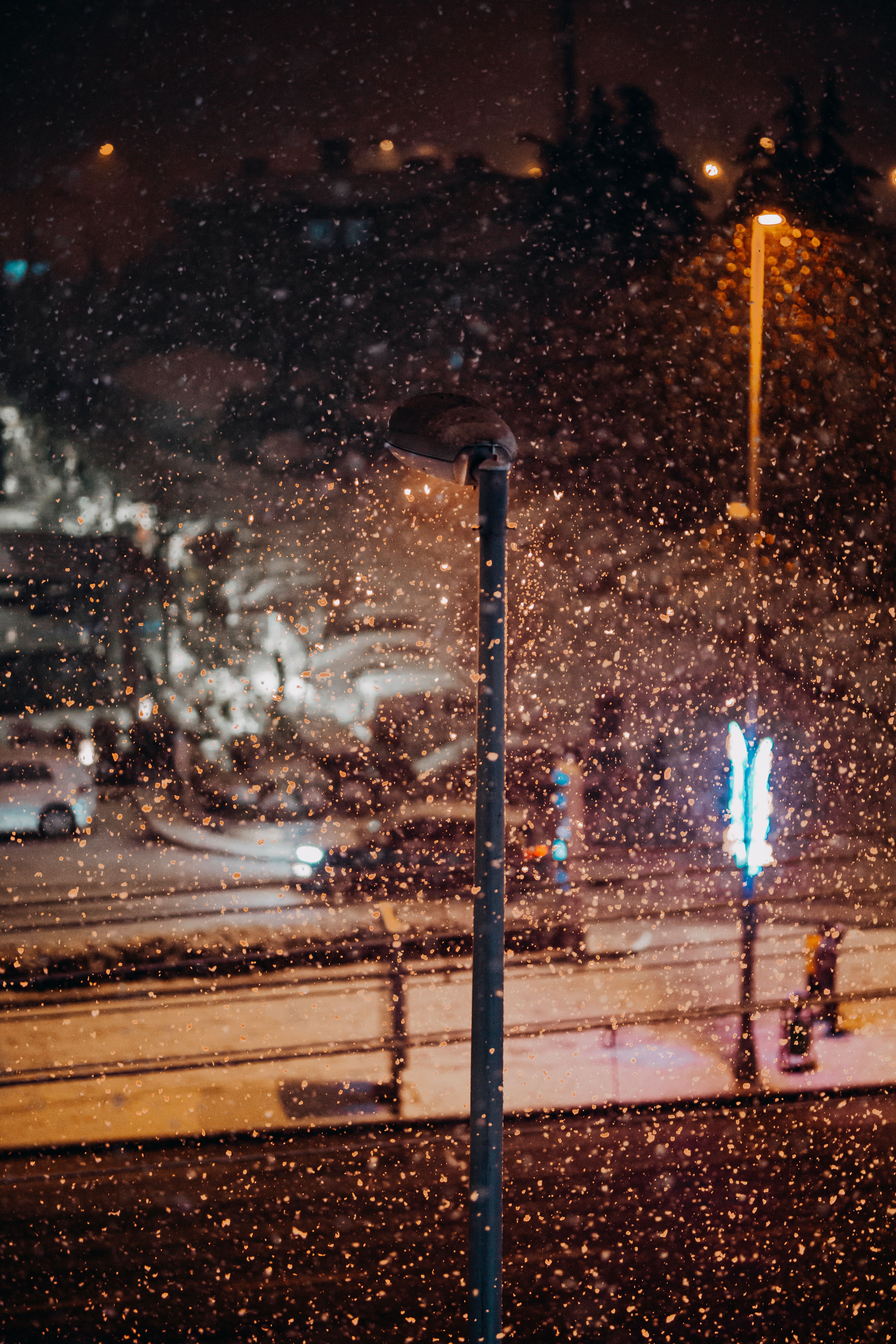 Snow Falling At Night In The City