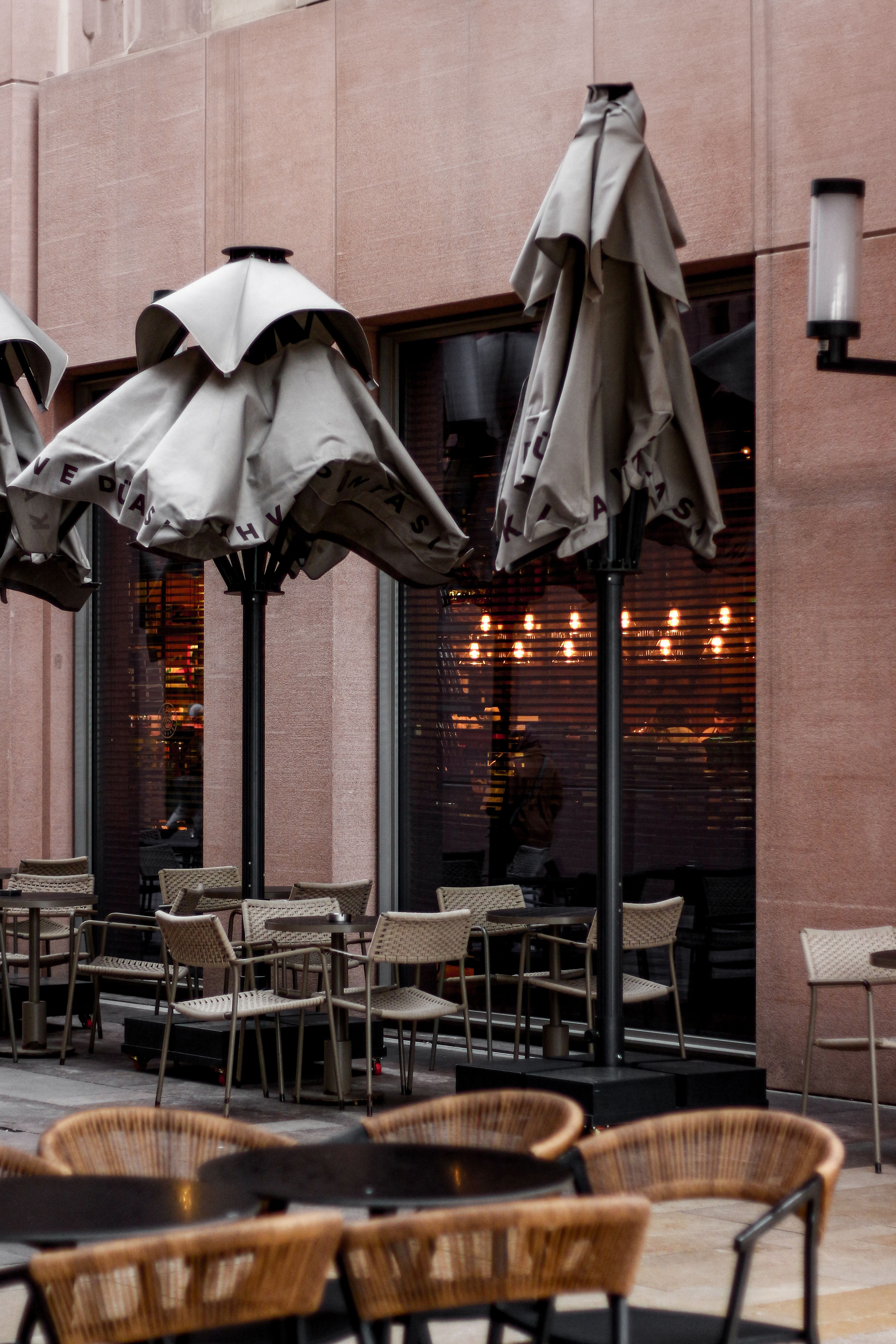 Rolled Up Umbrellas and Tables in Front of the Restaurant · Free Stock ...