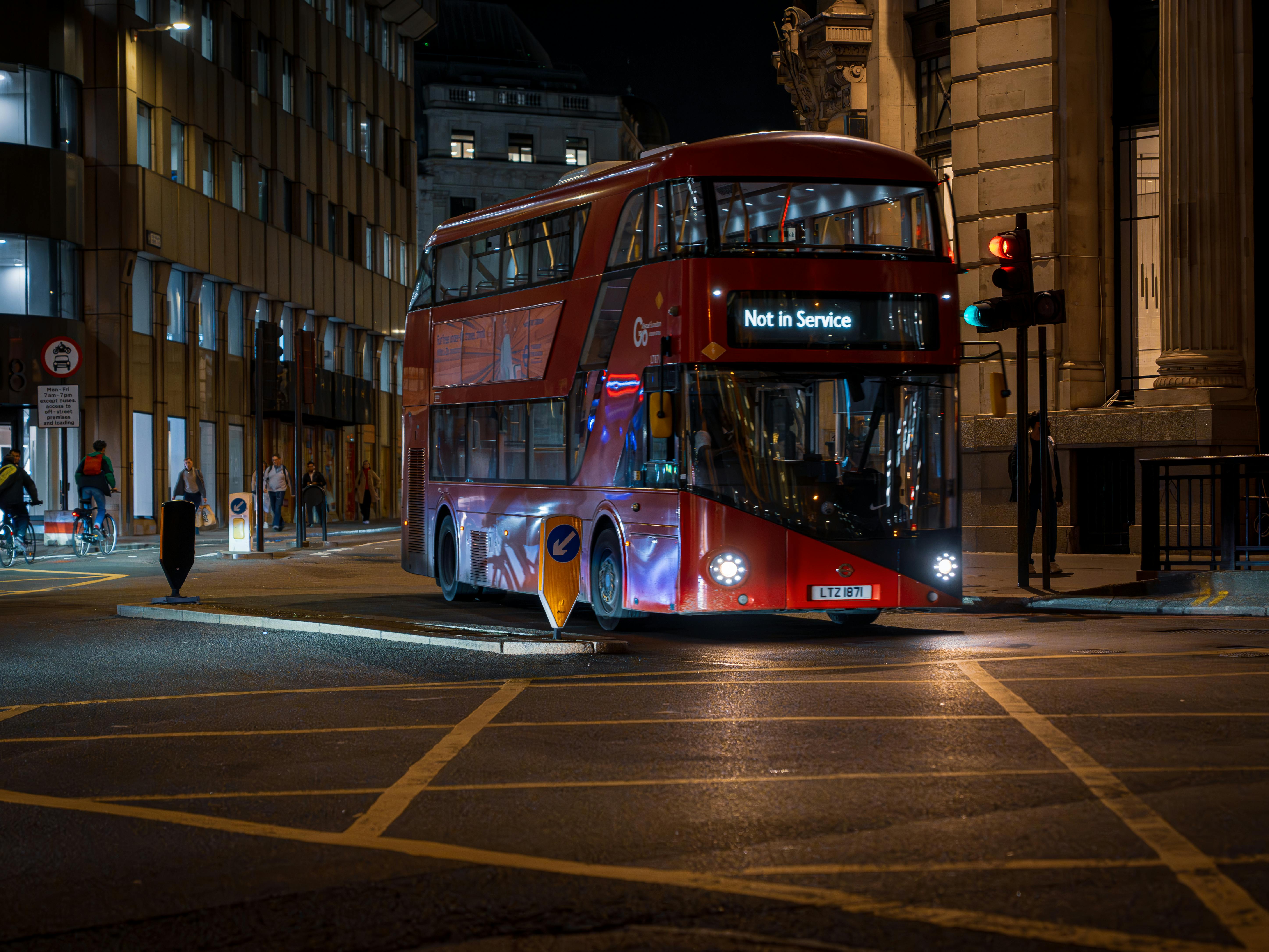 Red Bus on a Street in London at Night · Free Stock Photo