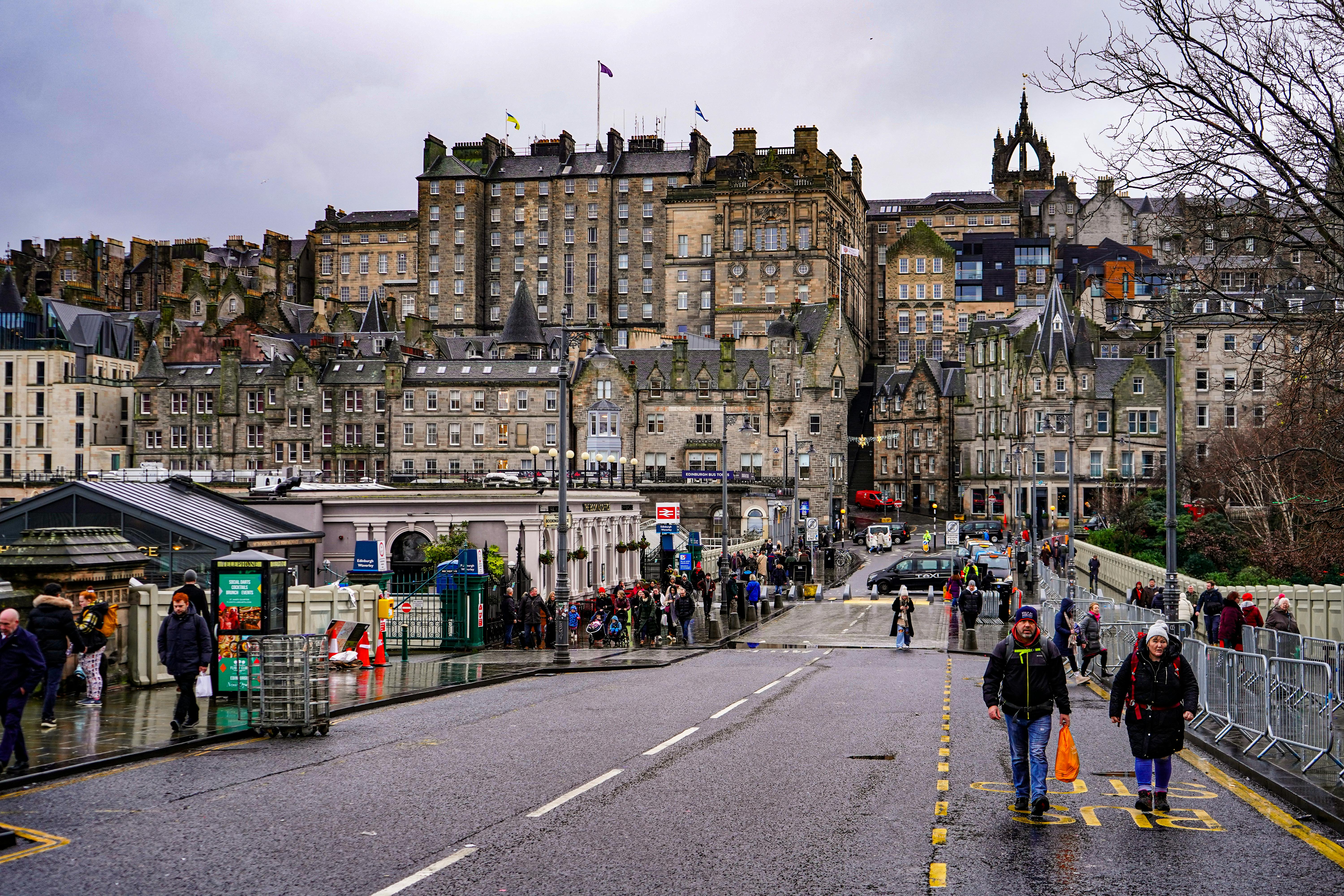 People Walking on Waverley Bridge on a Rainy Day, Edinburgh, Scotland ...