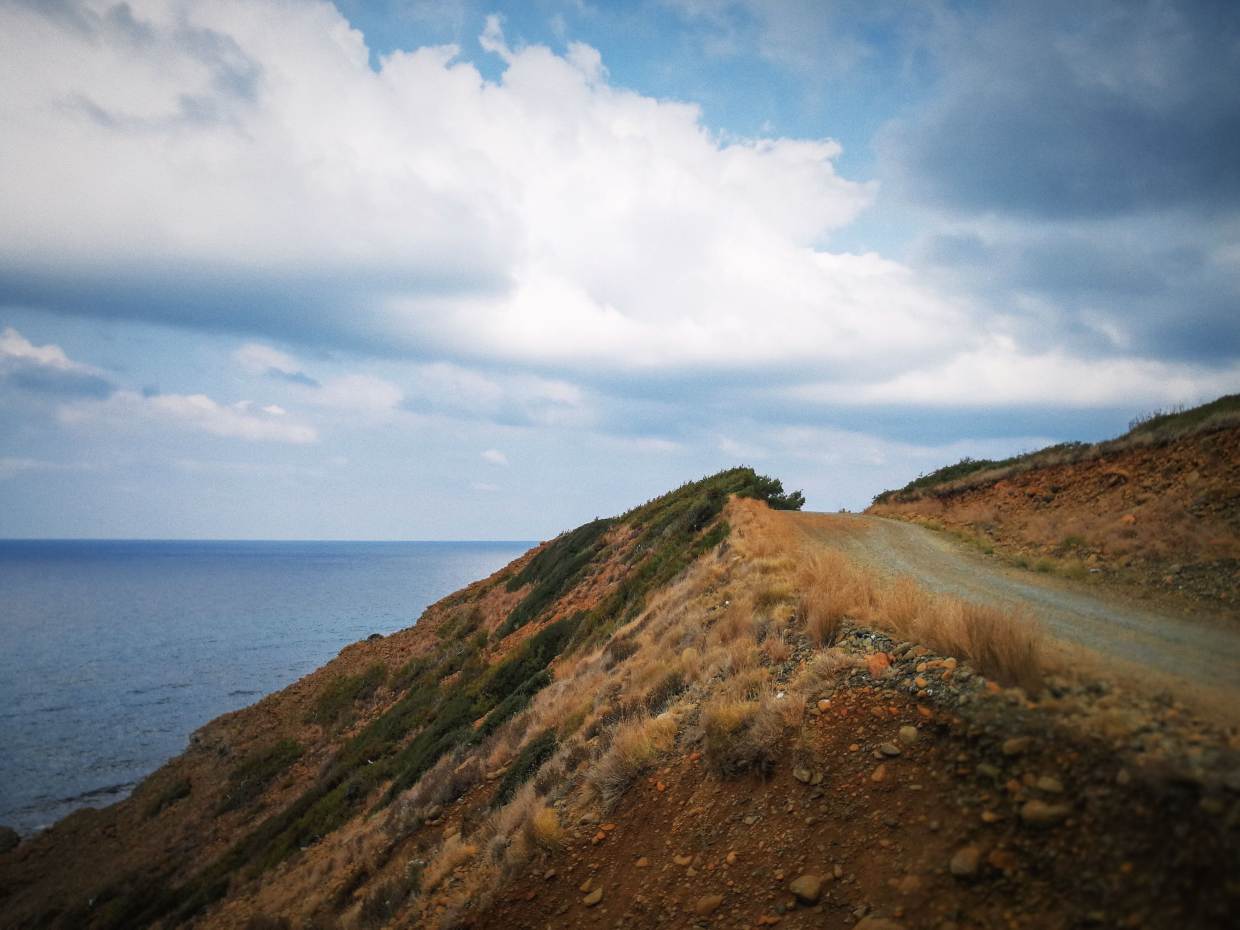 View of a Road on a Hill along the Coast · Free Stock Photo