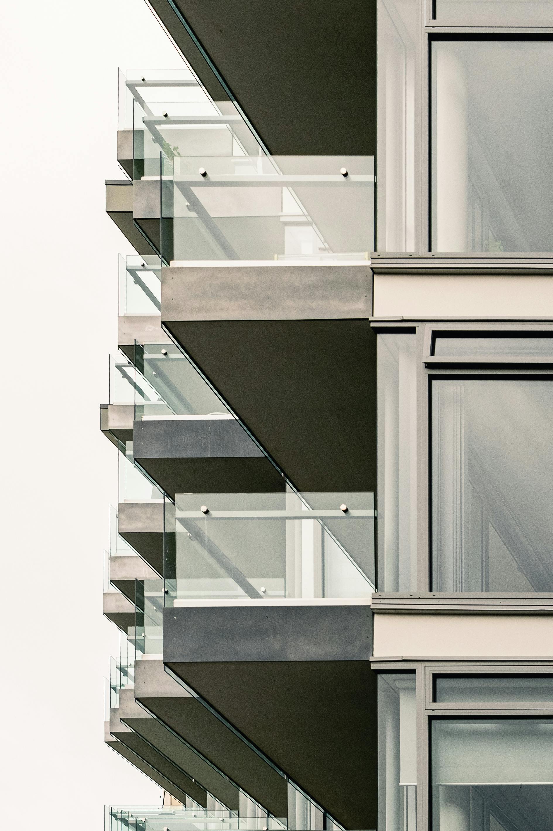 Glass Cube Balconies with Potted Trees · Free Stock Photo
