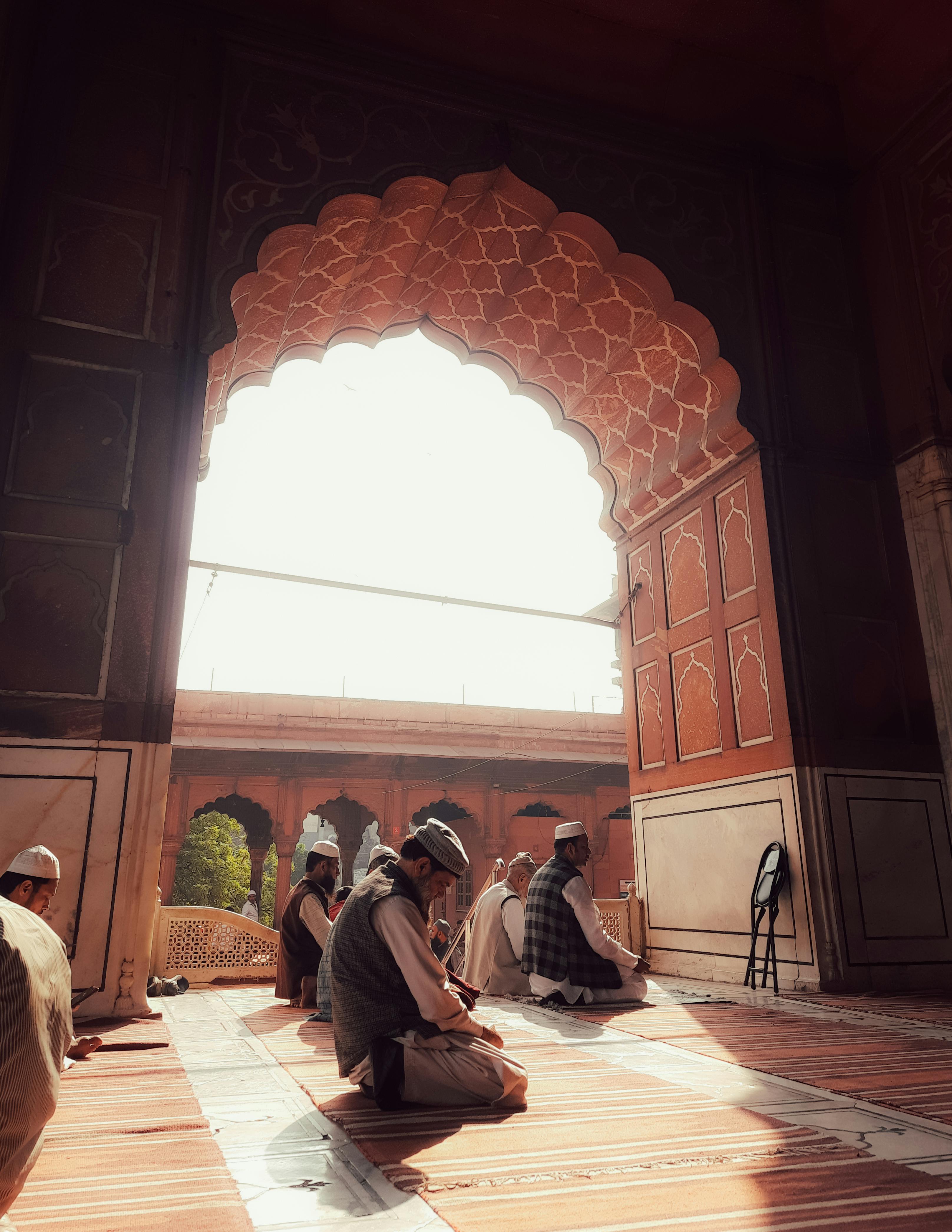 Men Kneeling and Praying in Jama Masjid in Old Delhi · Free Stock Photo