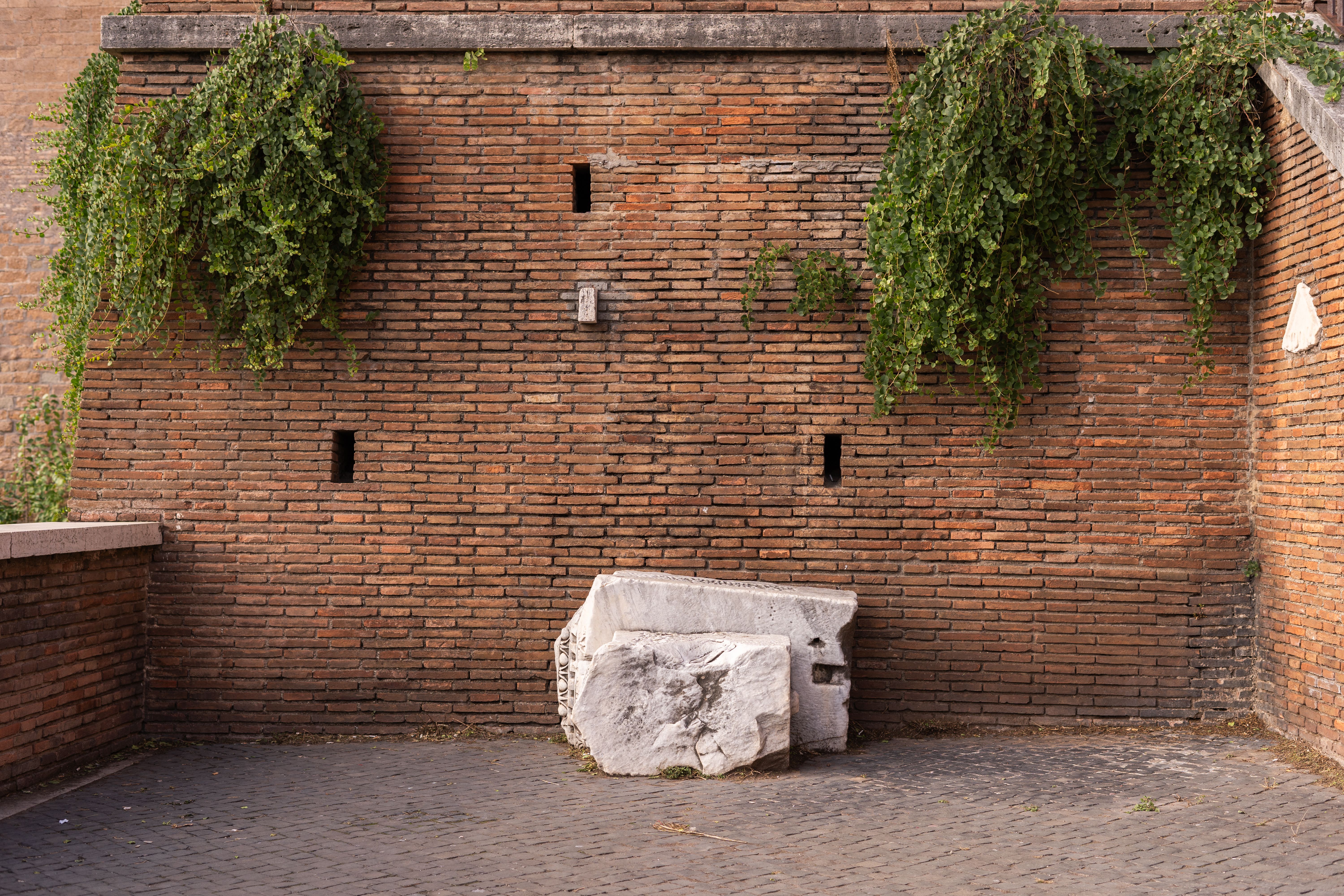 Bricks on Castle Wall over Stone below · Free Stock Photo