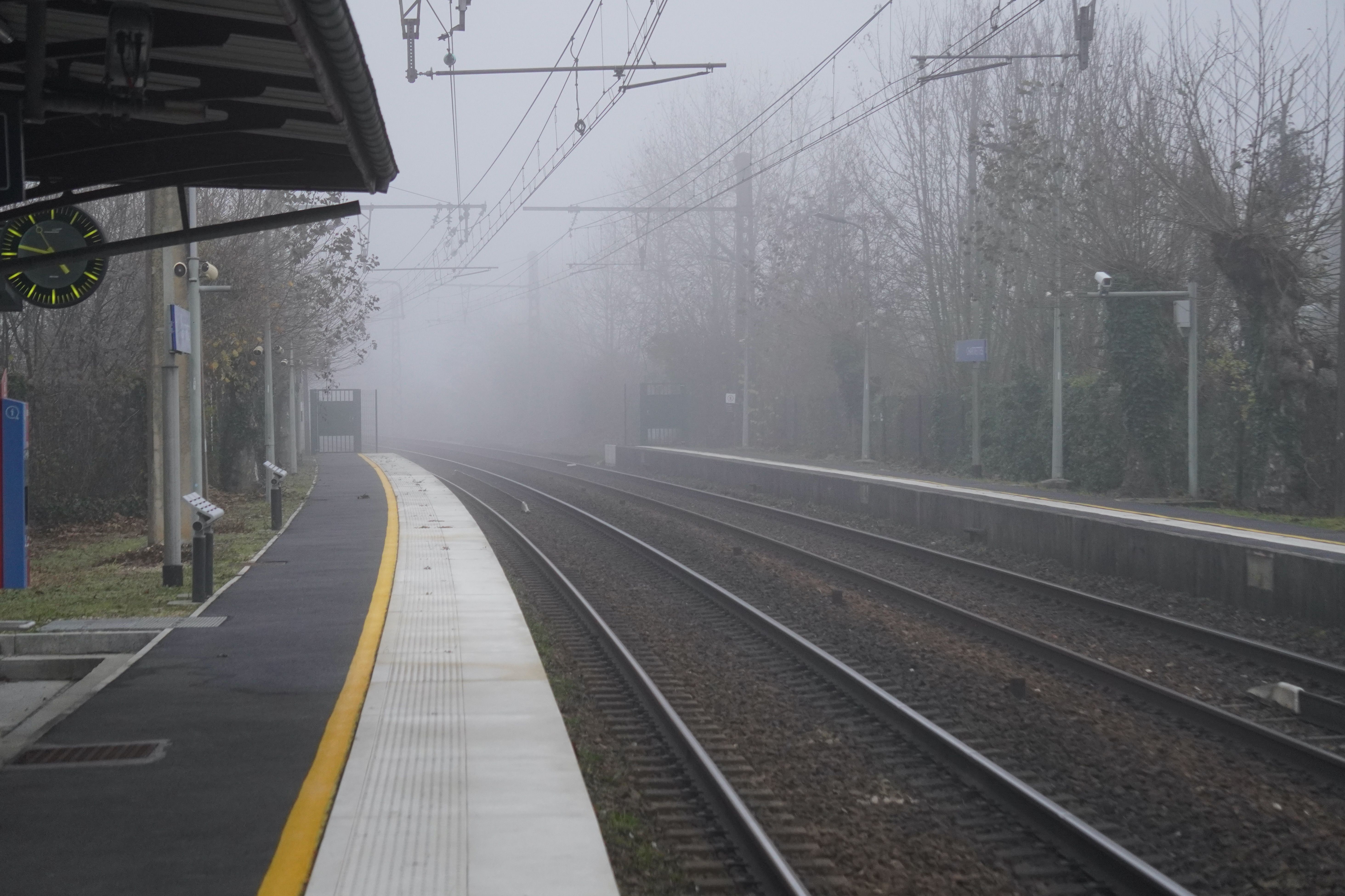 Railway Station Covered with Fog · Free Stock Photo