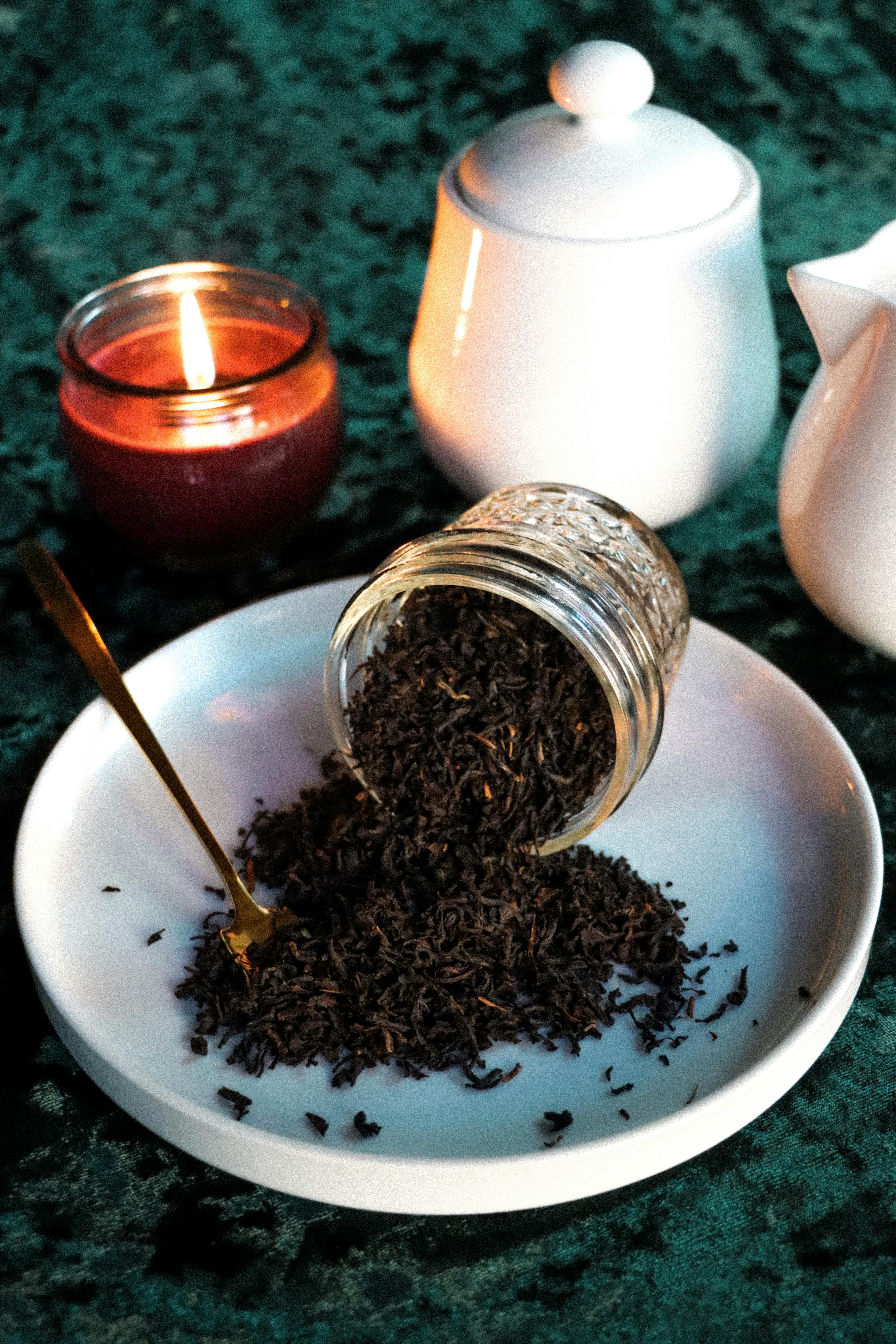 Dried Tea Leaves Spilling out of a Jar · Free Stock Photo