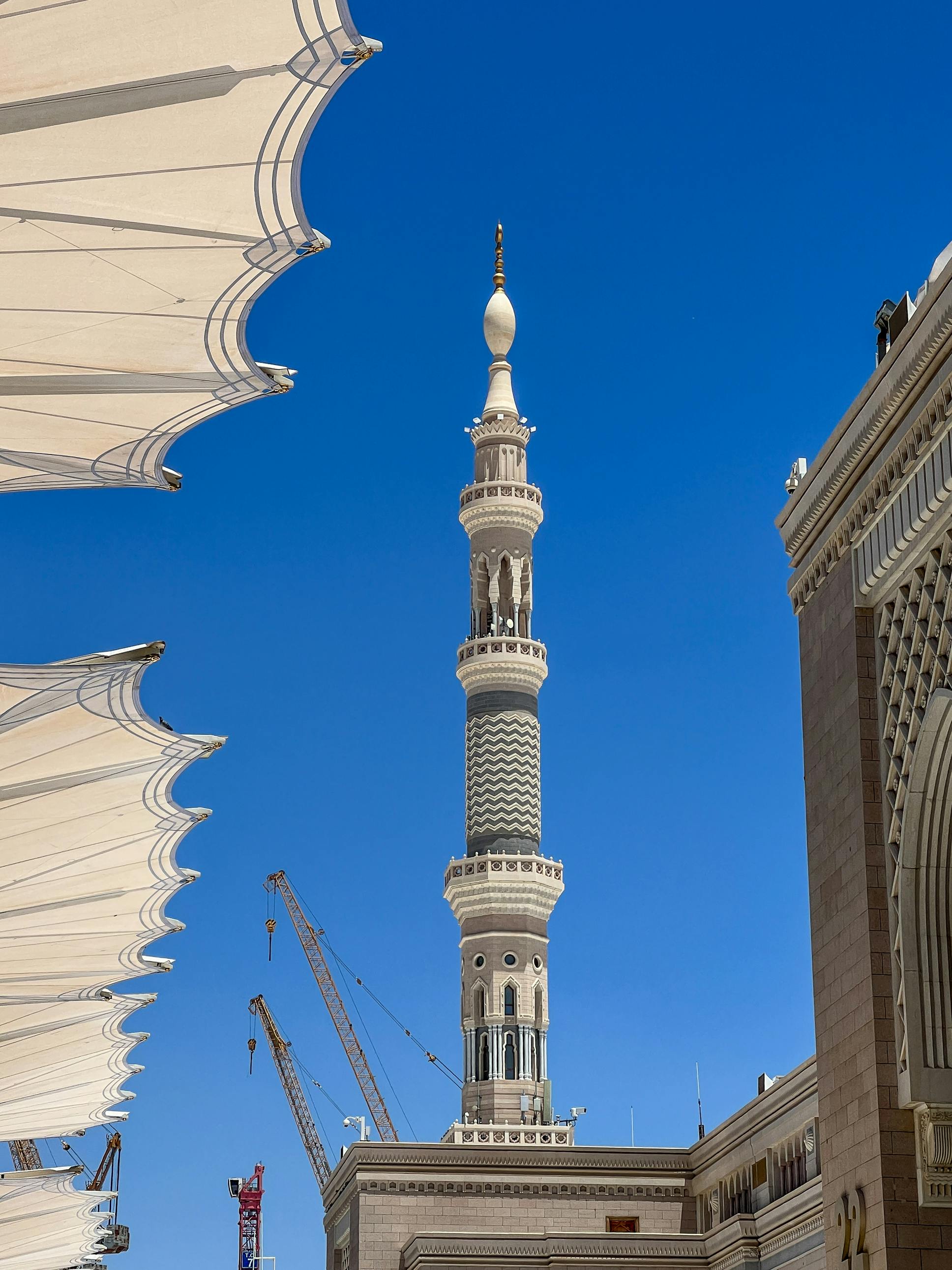 Low Angle Shot of Jamia Masjid Al-Sadiq Under Blue Sky · Free Stock Photo