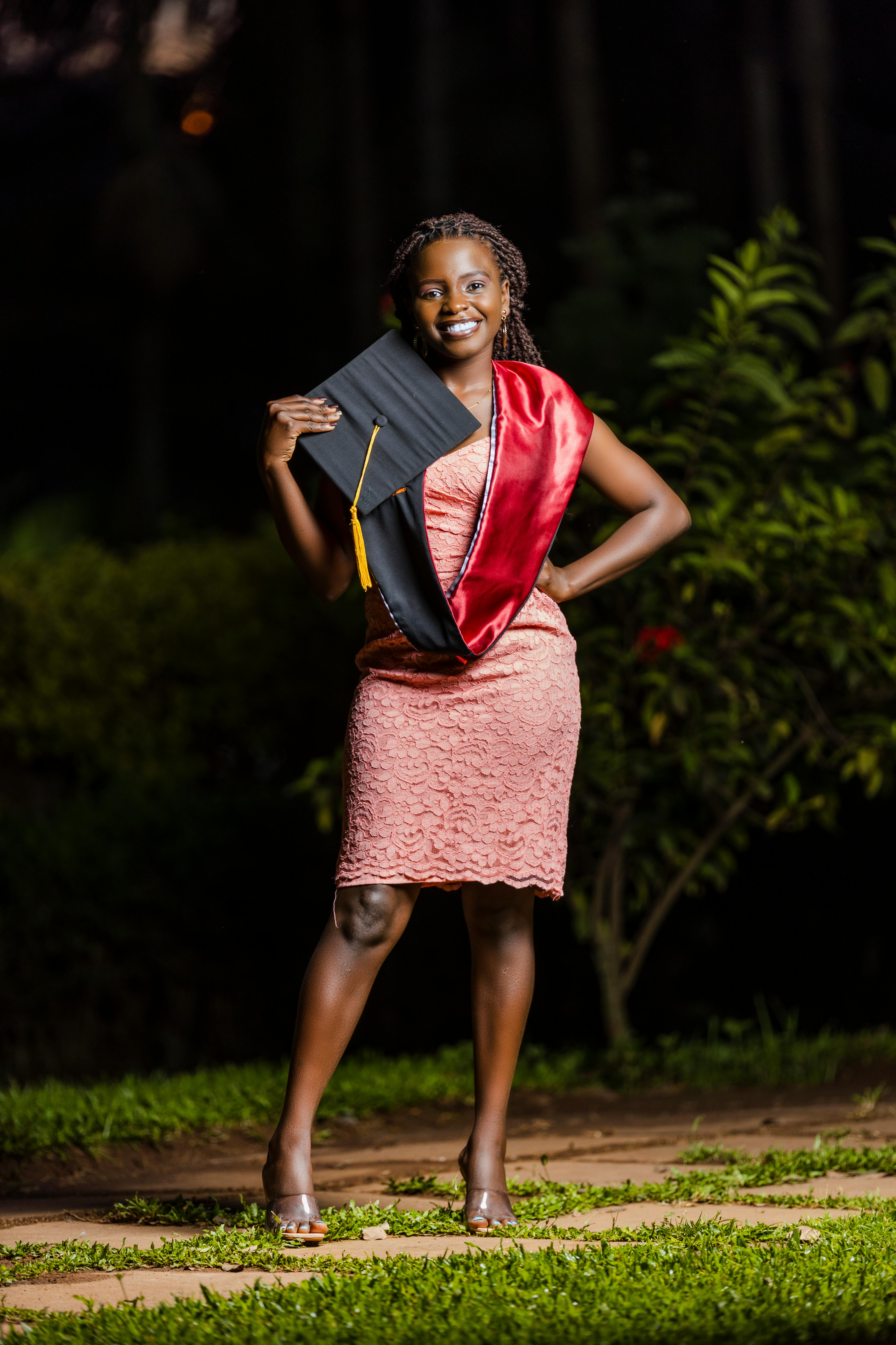 Woman Wearing Graduation Clothing · Free Stock Photo