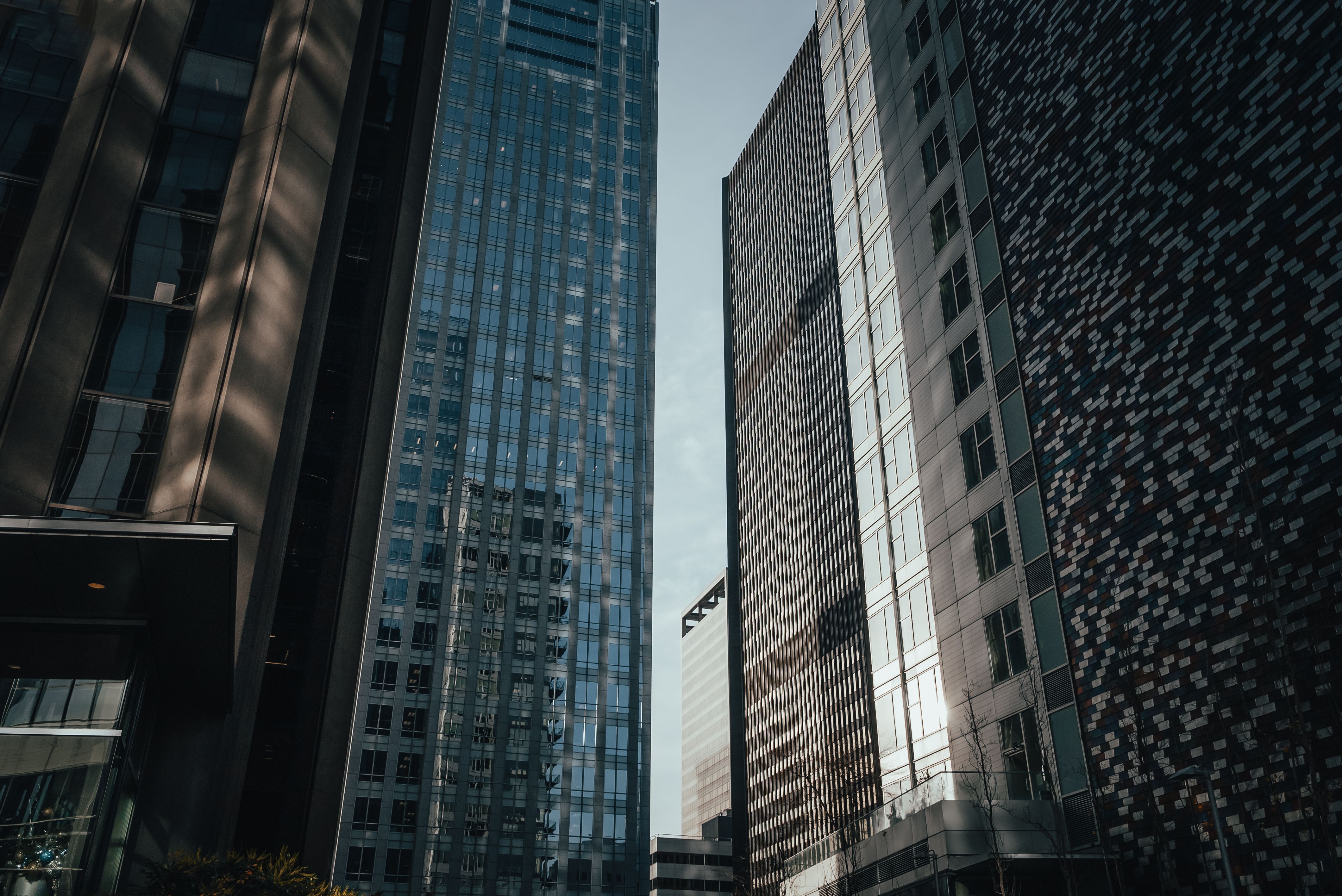 Blue Sky in Gap between Glass Skysc · Free Stock Photo