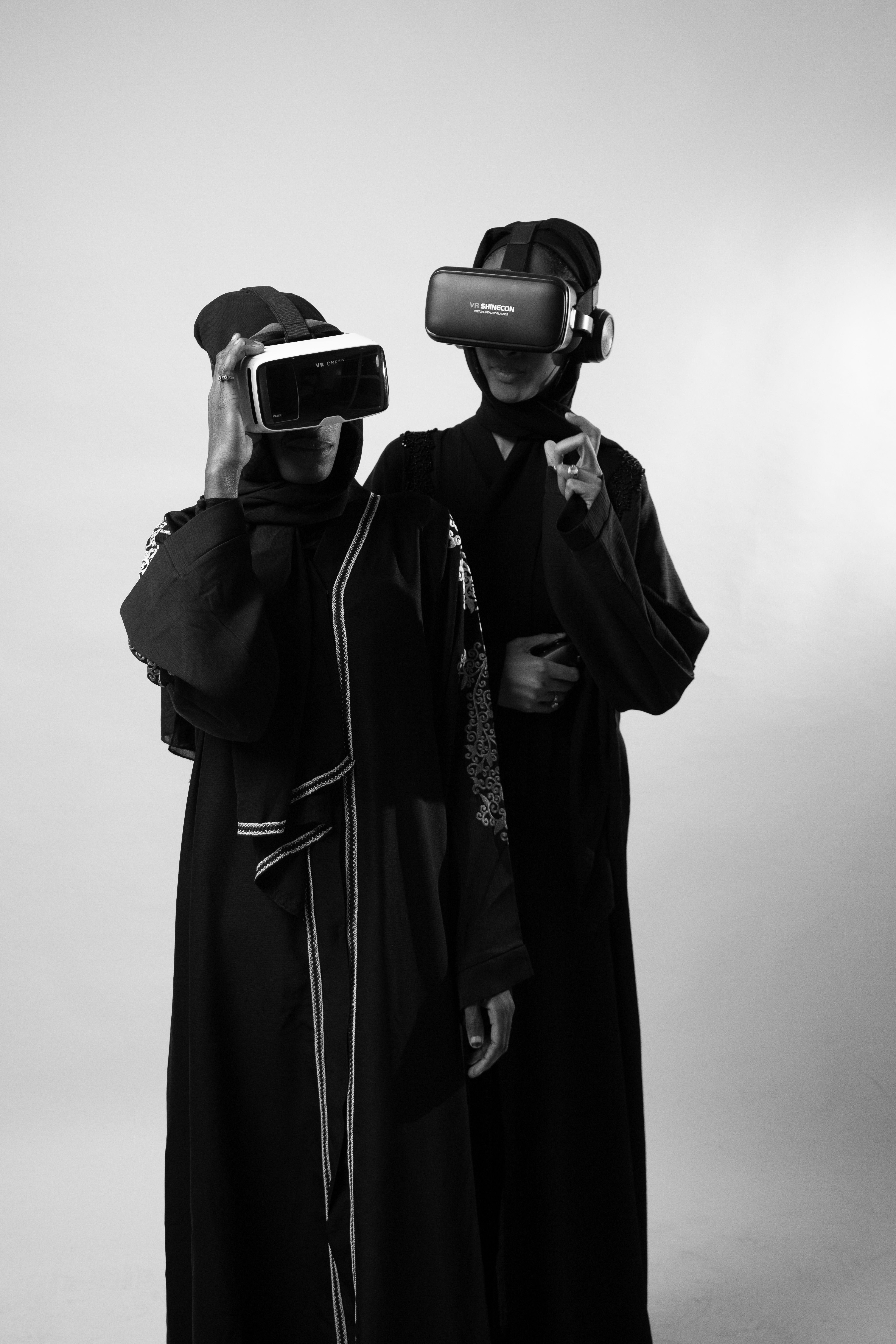 Model Using a VR Headset with a Wireless Controller and Headphones ...