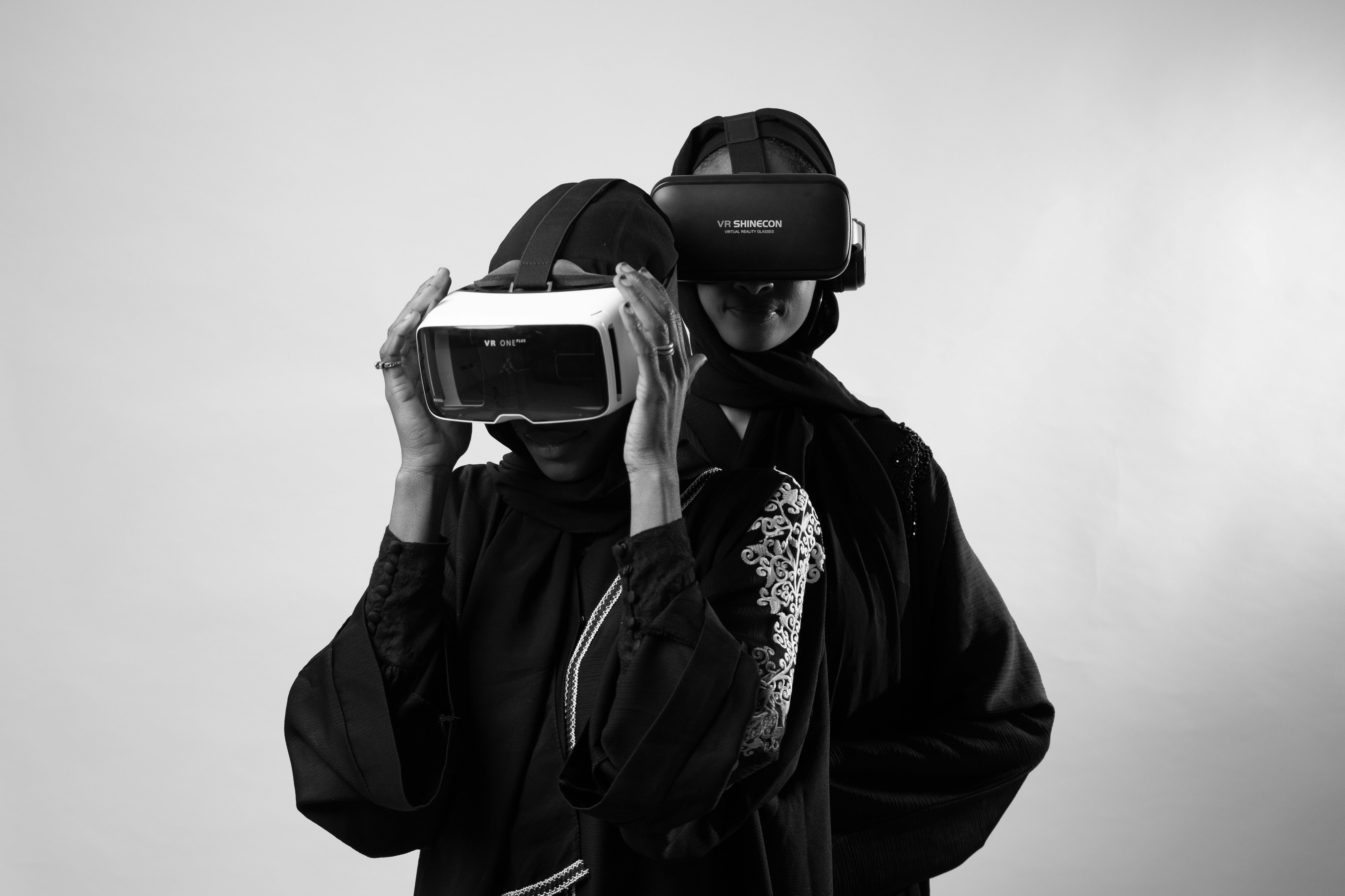 Women in Traditional Clothing Wearing VR Headsets · Free Stock Photo