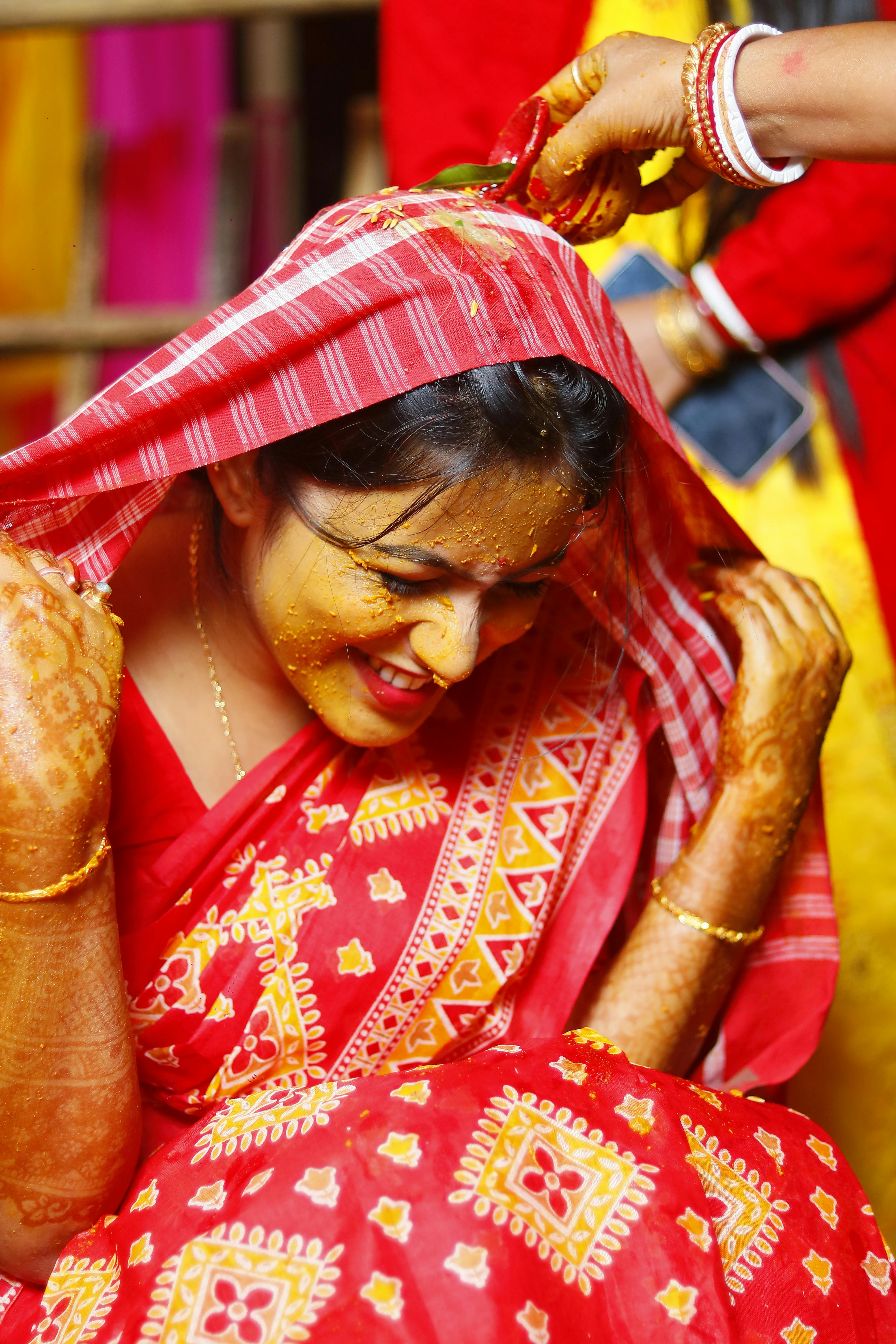 Woman in Sari during Traditional Ceremony · Free Stock Photo