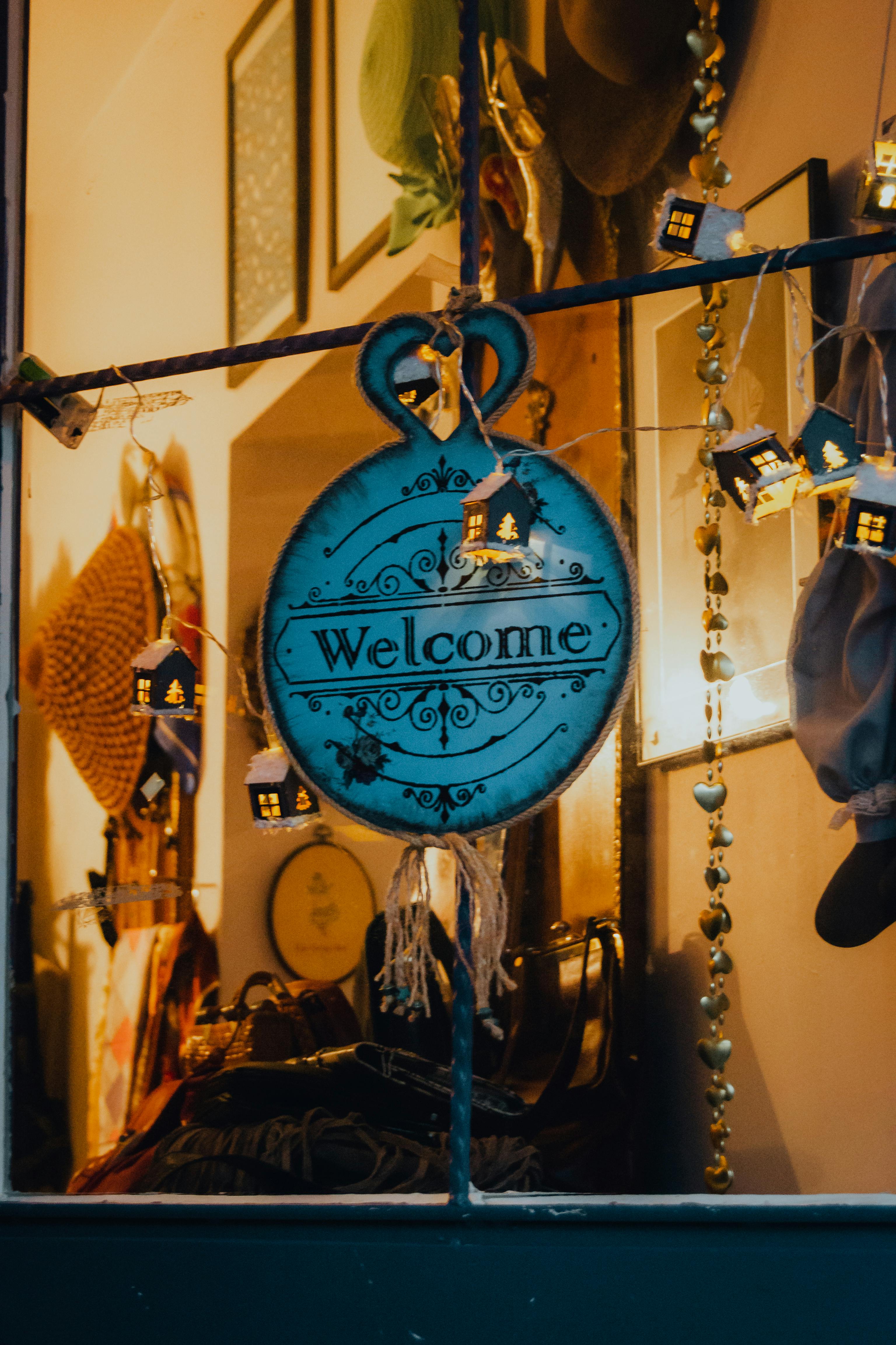 Welcome Sign in a Shop · Free Stock Photo