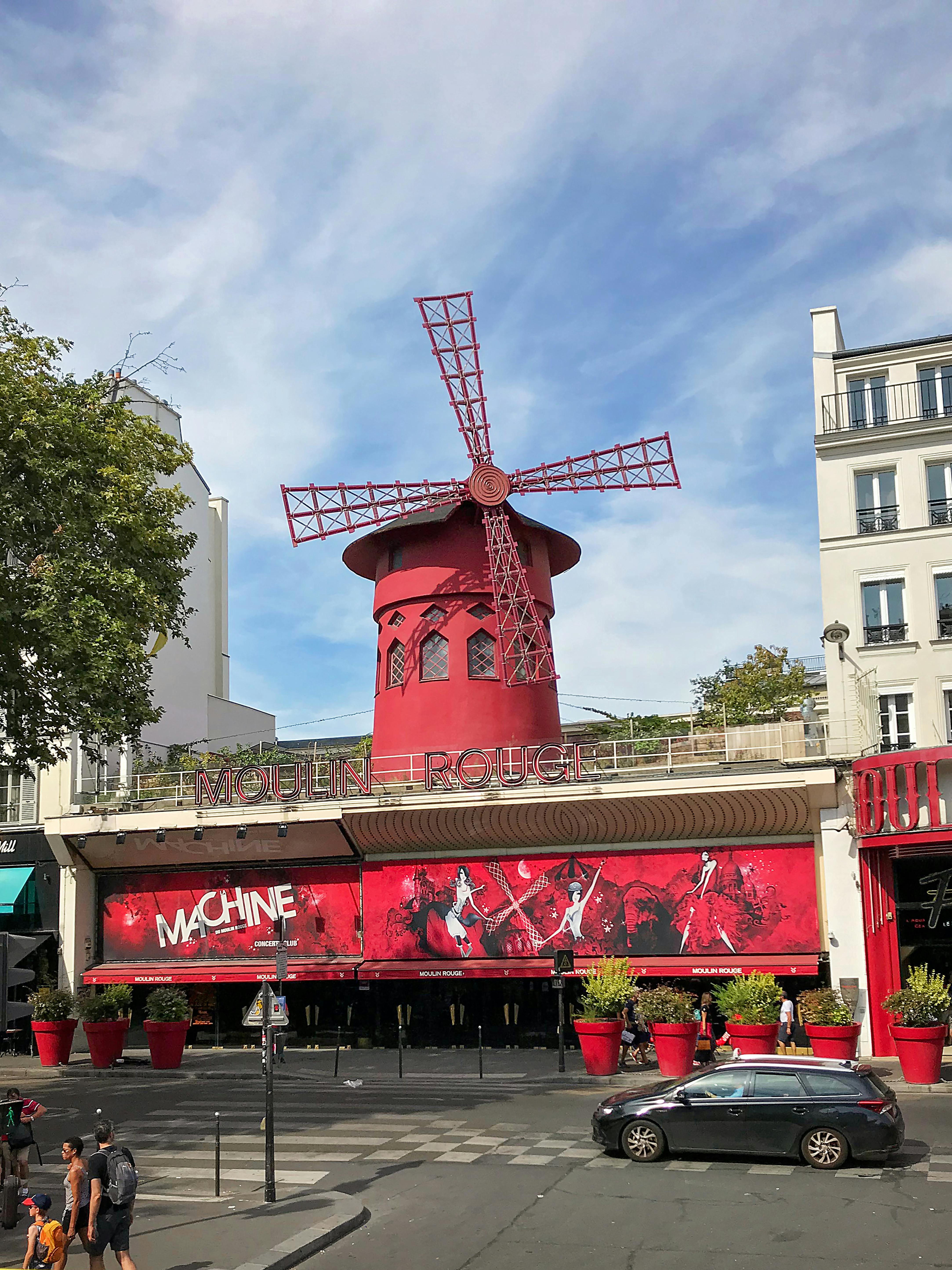 Red Windmill on a Street in Paris · Free Stock Photo