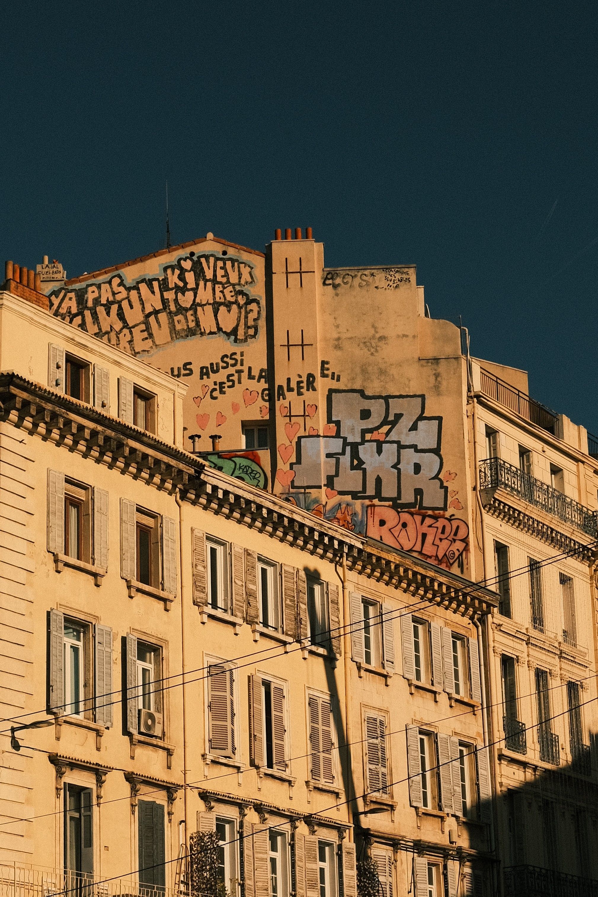 Graffiti on Building Wall · Free Stock Photo