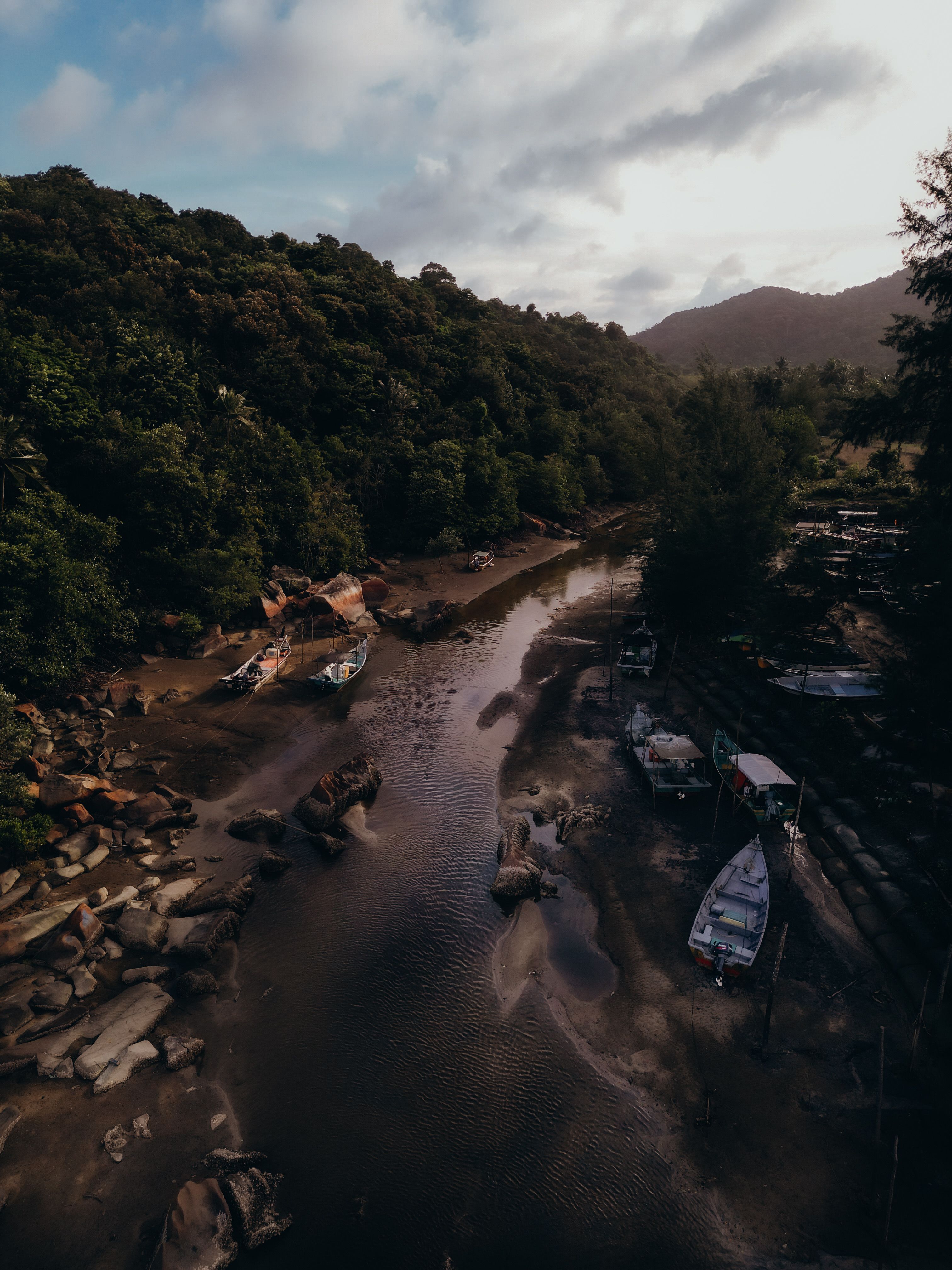Fishing Boats on the Riverbank from a Birds Eye View · Free Stock Photo