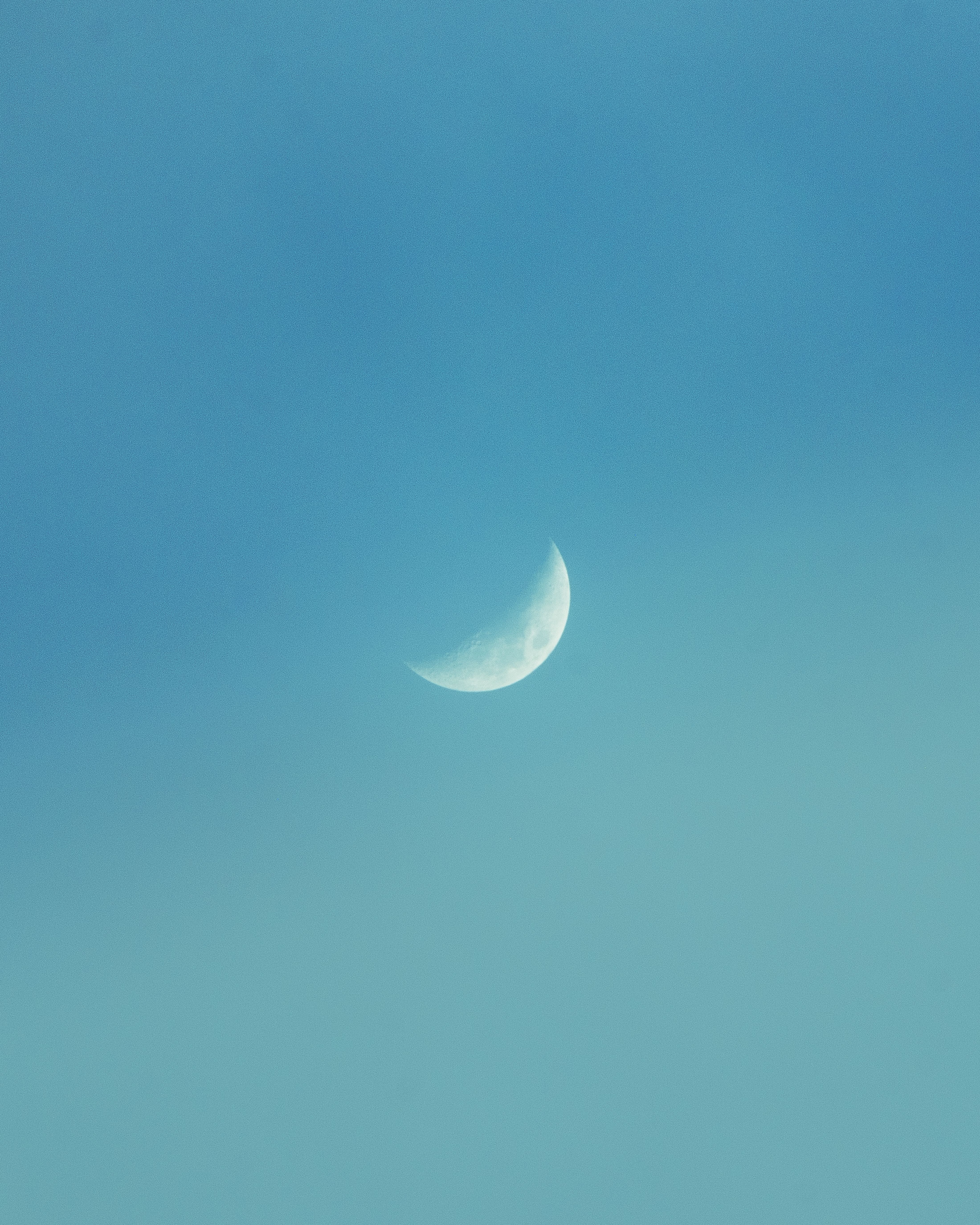 Crescent Moon on a Blue Sky during the Day · Free Stock Photo