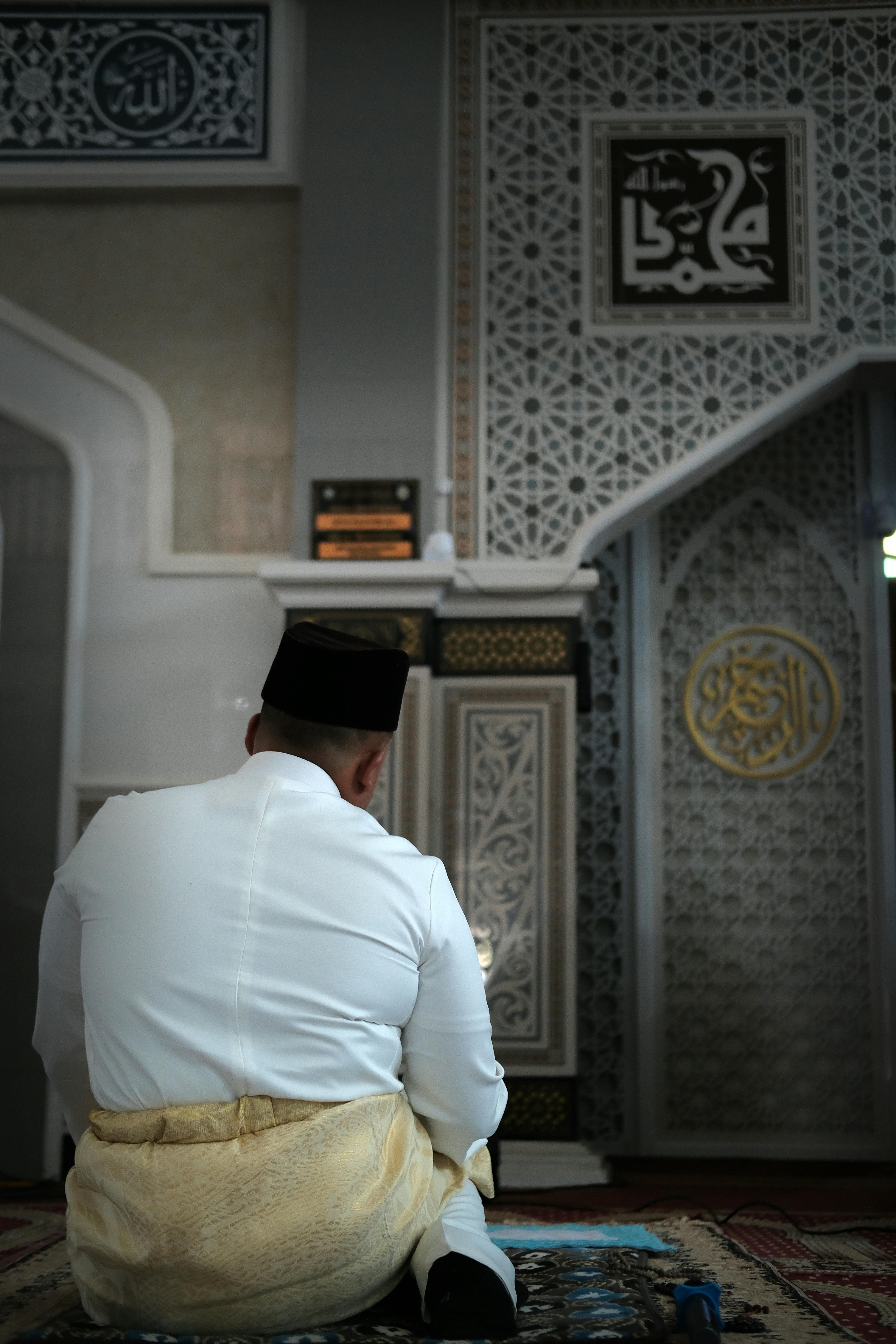 Man Praying in Mosque · Free Stock Photo