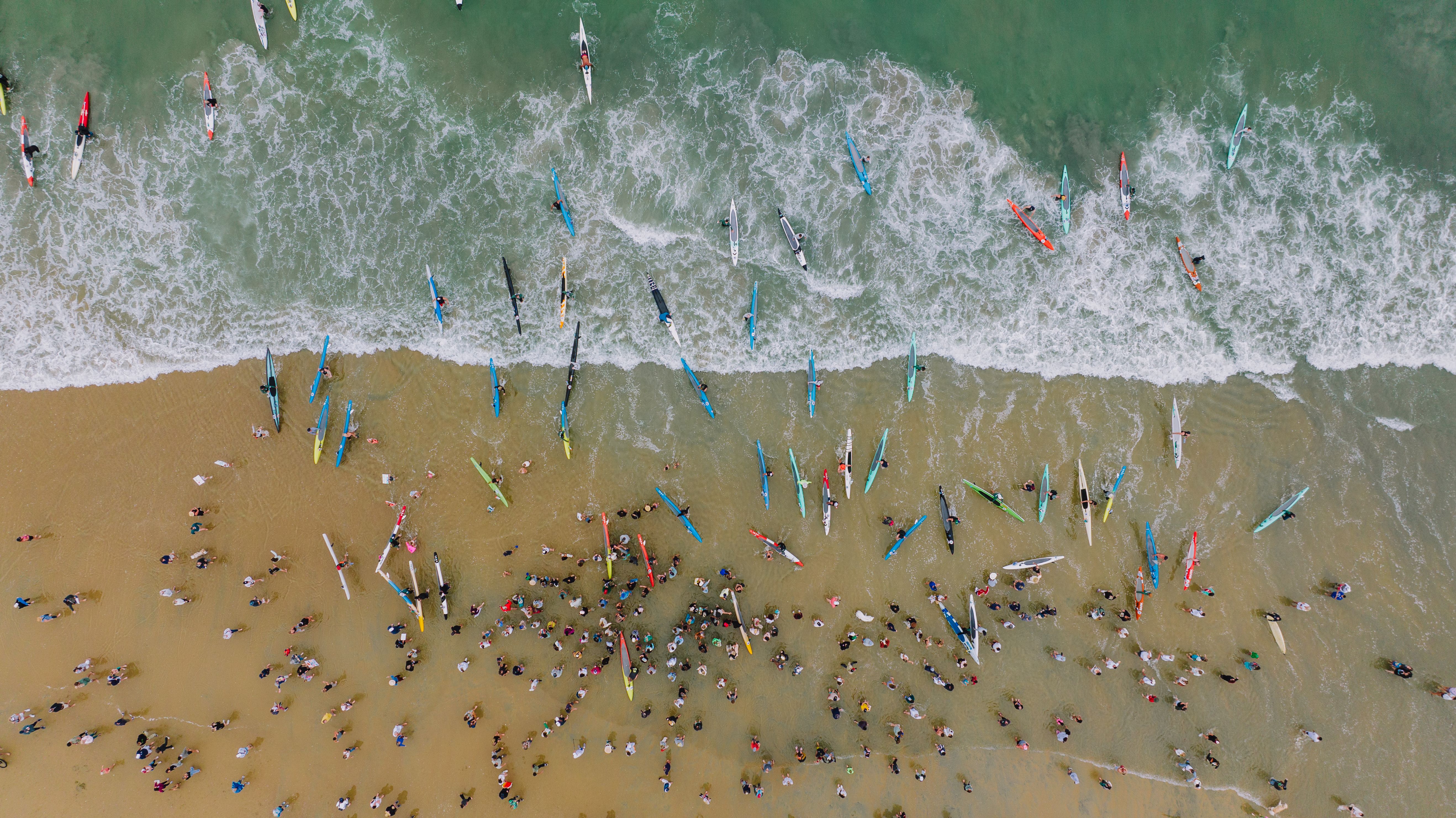 Crowd of Tourists with Surfboards on the Beach from a Birds Eye View ...