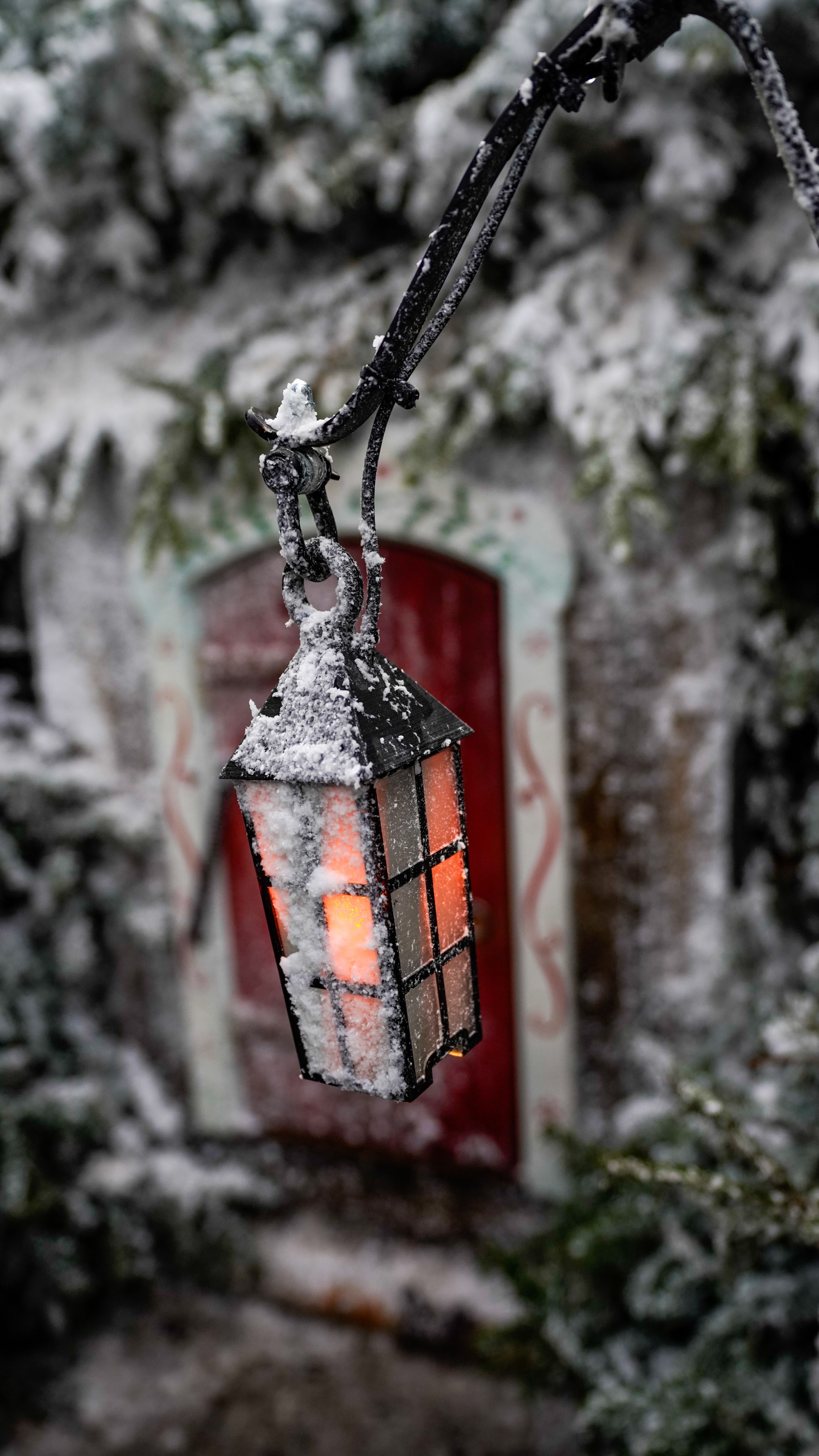 Hanging Retro Style Lantern Covered with Snow · Free Stock Photo